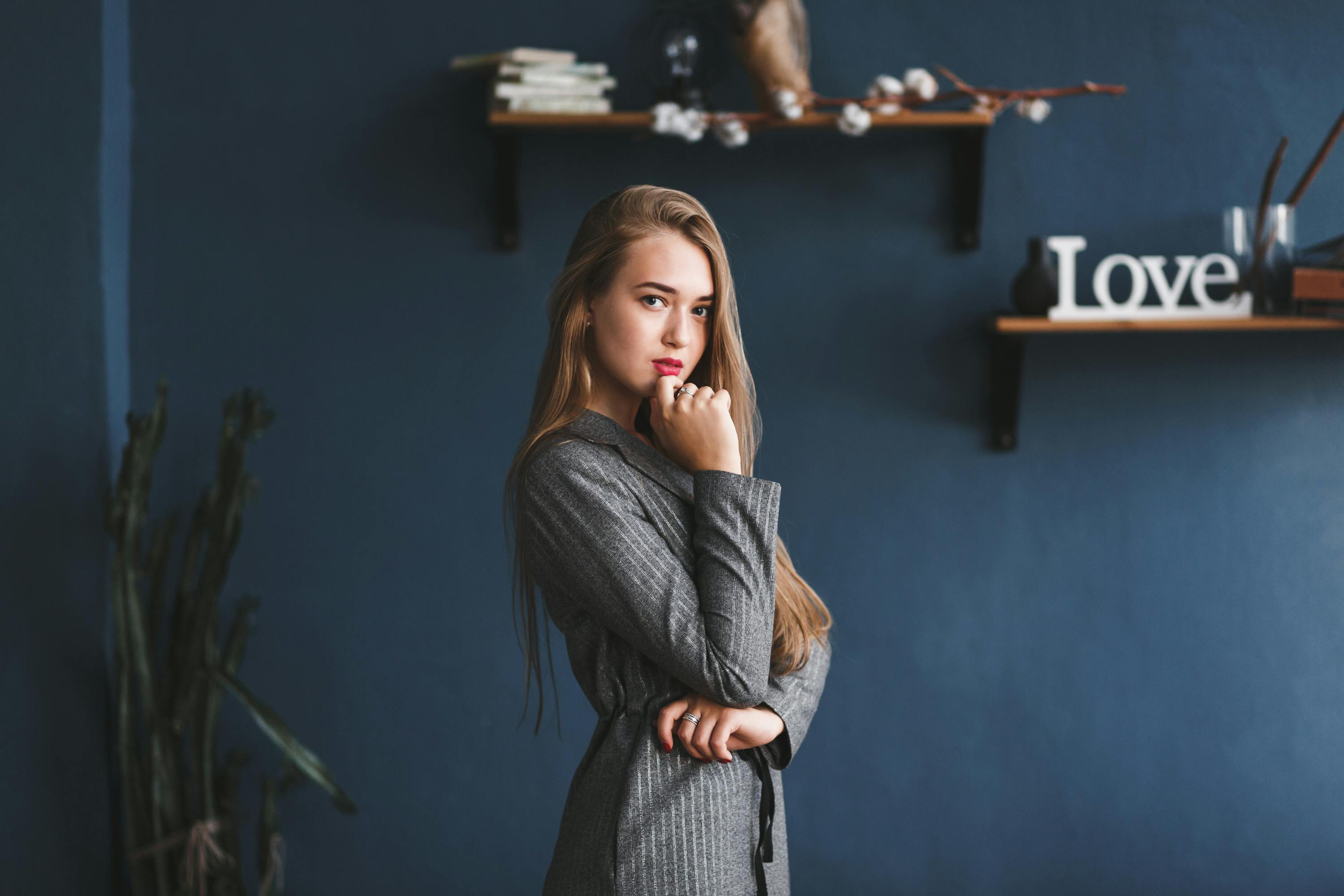 A Woman Pointing her Chin · Free Stock Photo