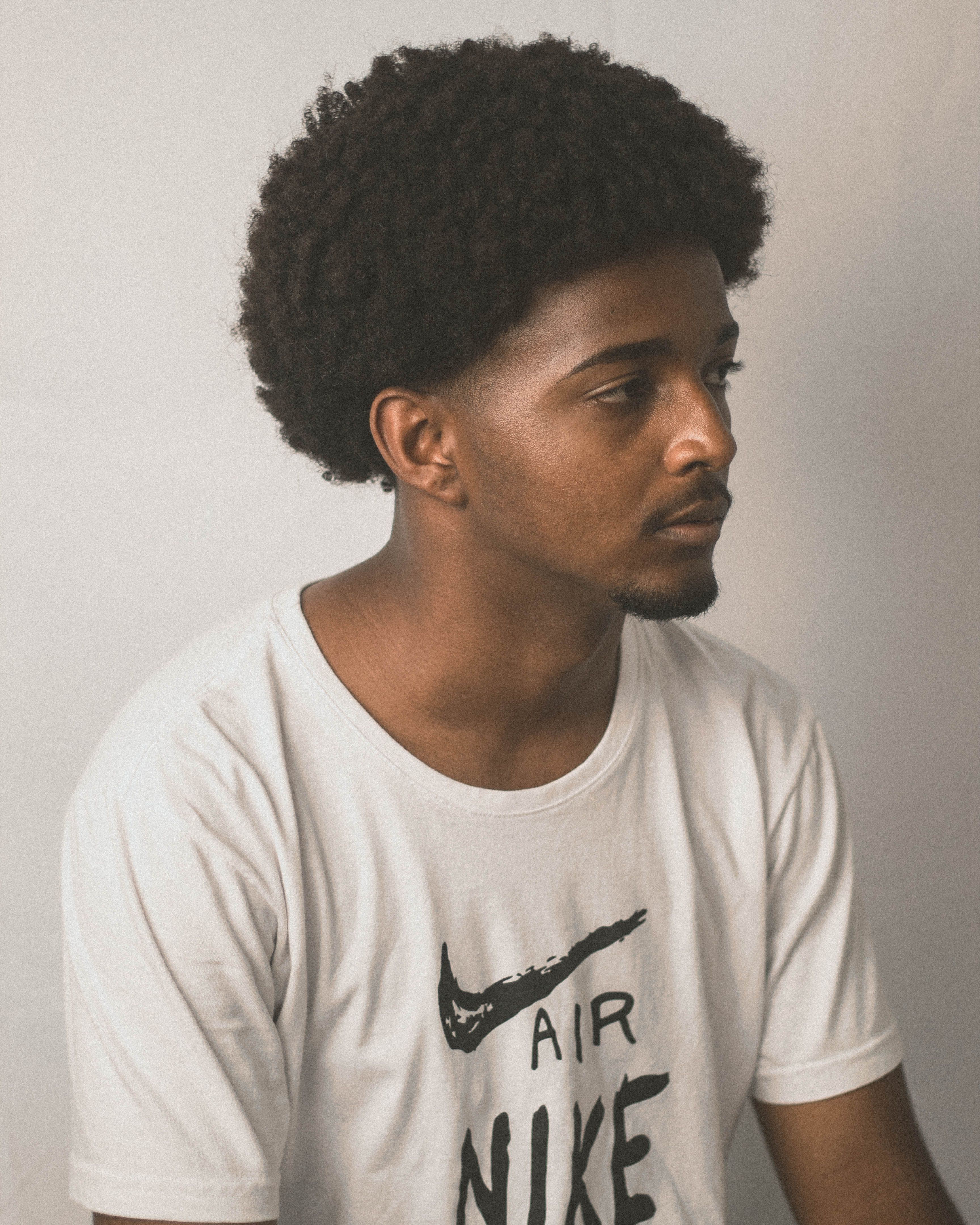 Young Man Posing on White Background · Free Stock Photo