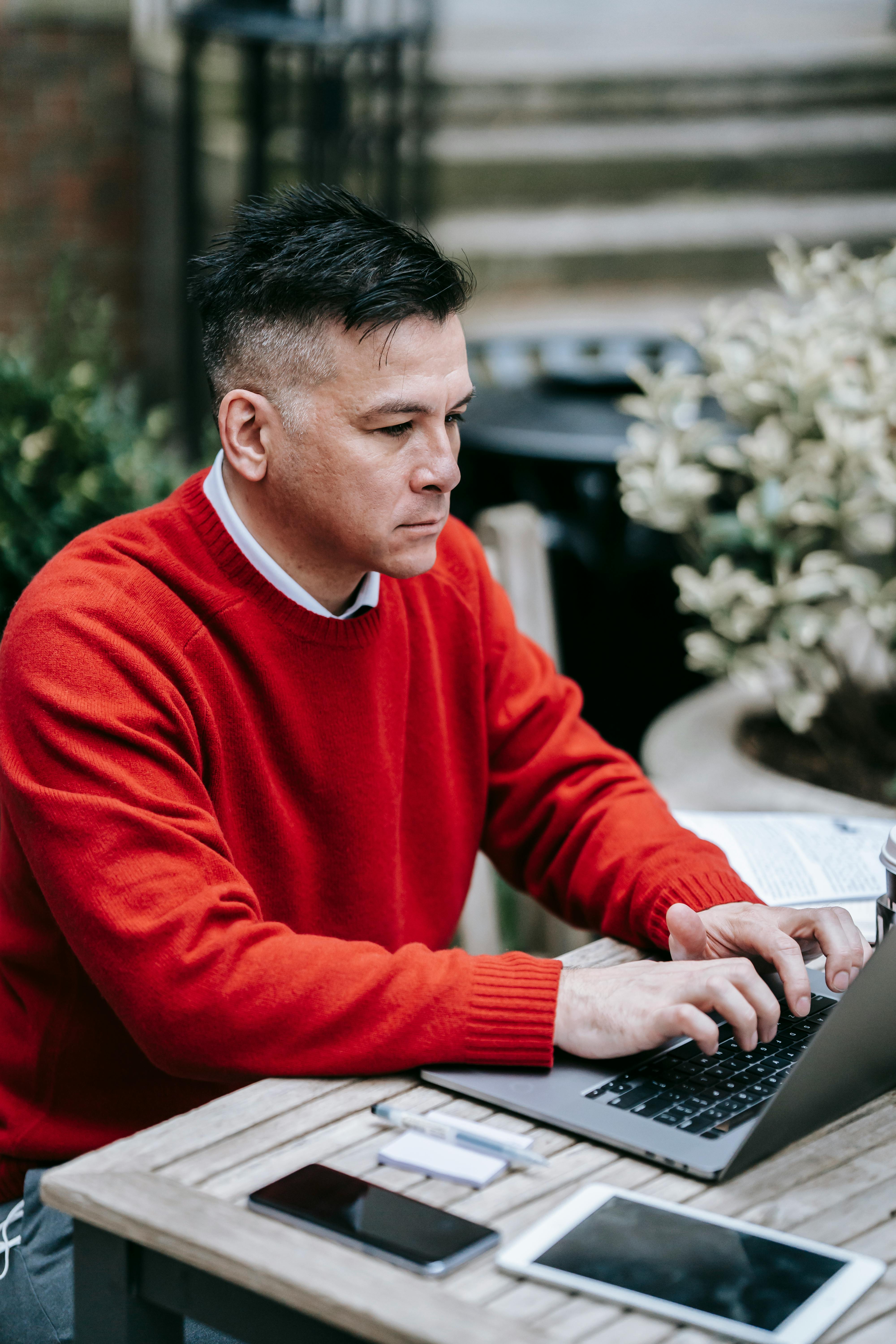 Photo Of Man Using Laptop · Free Stock Photo