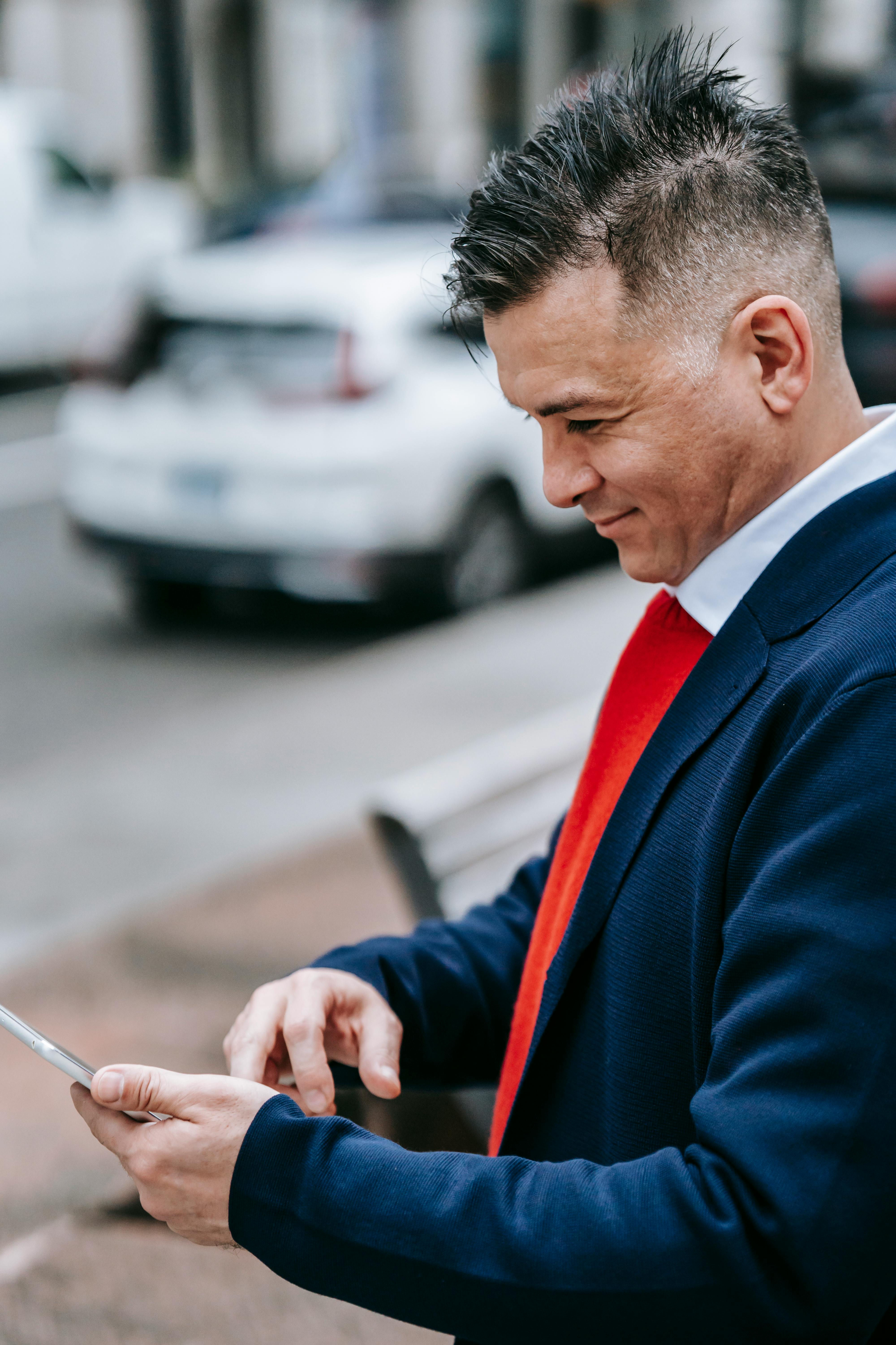 Photo Of Man Using Tablet · Free Stock Photo