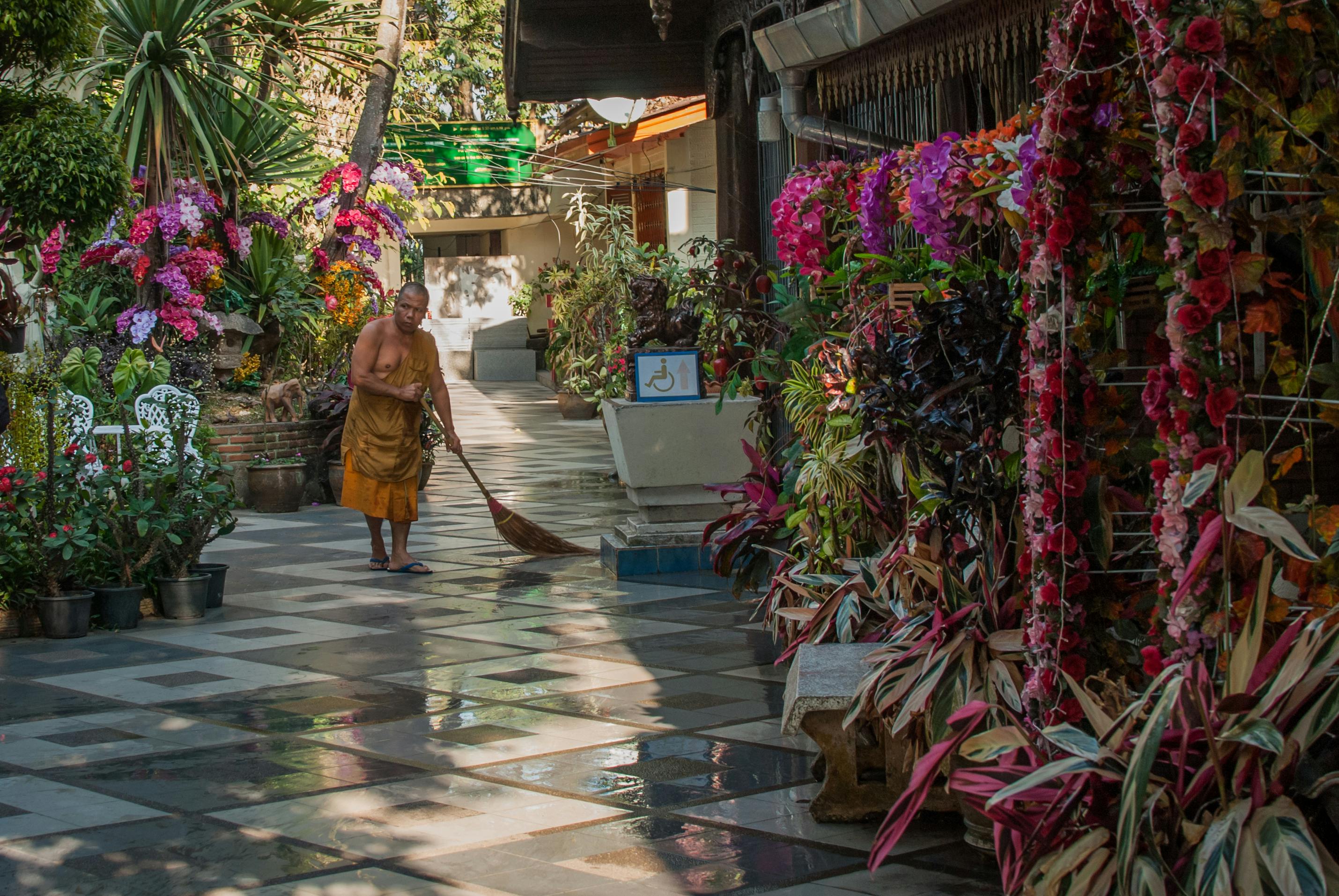 Monk Sweeping Floor in Temple · Free Stock Photo