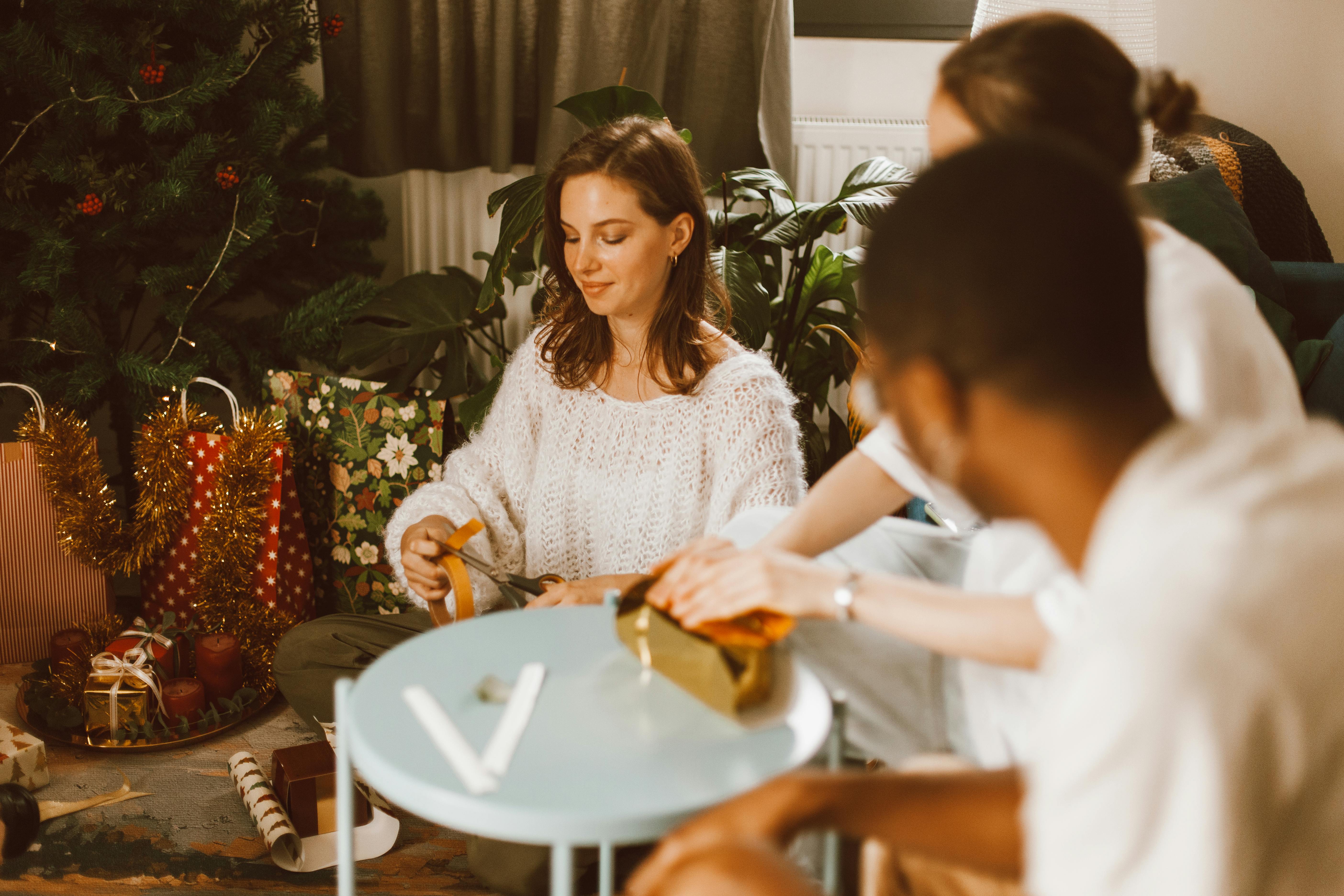 People Wrapping Christmas Presents · Free Stock Photo
