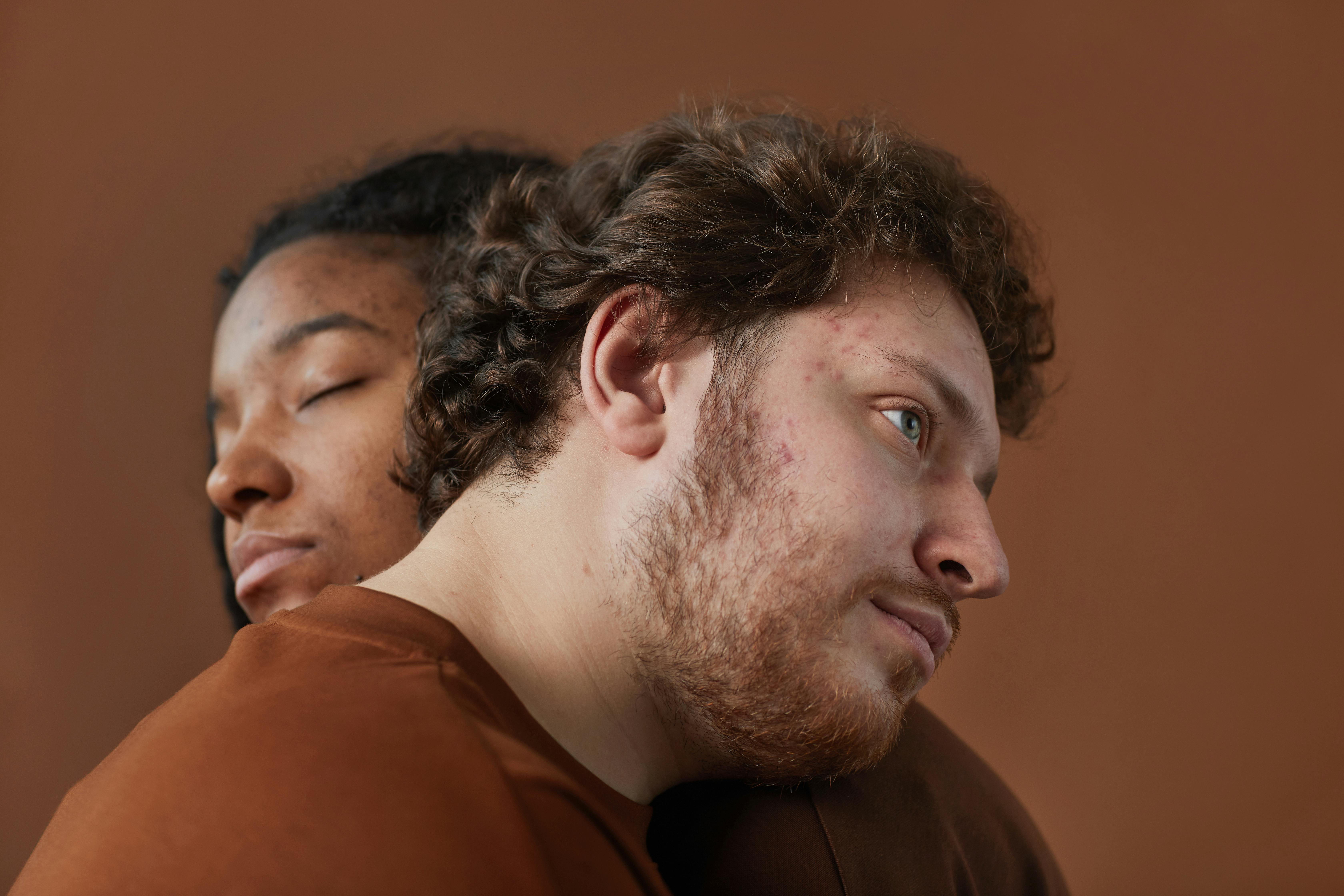 A Couple Leaning on Each Others Shoulder · Free Stock Photo