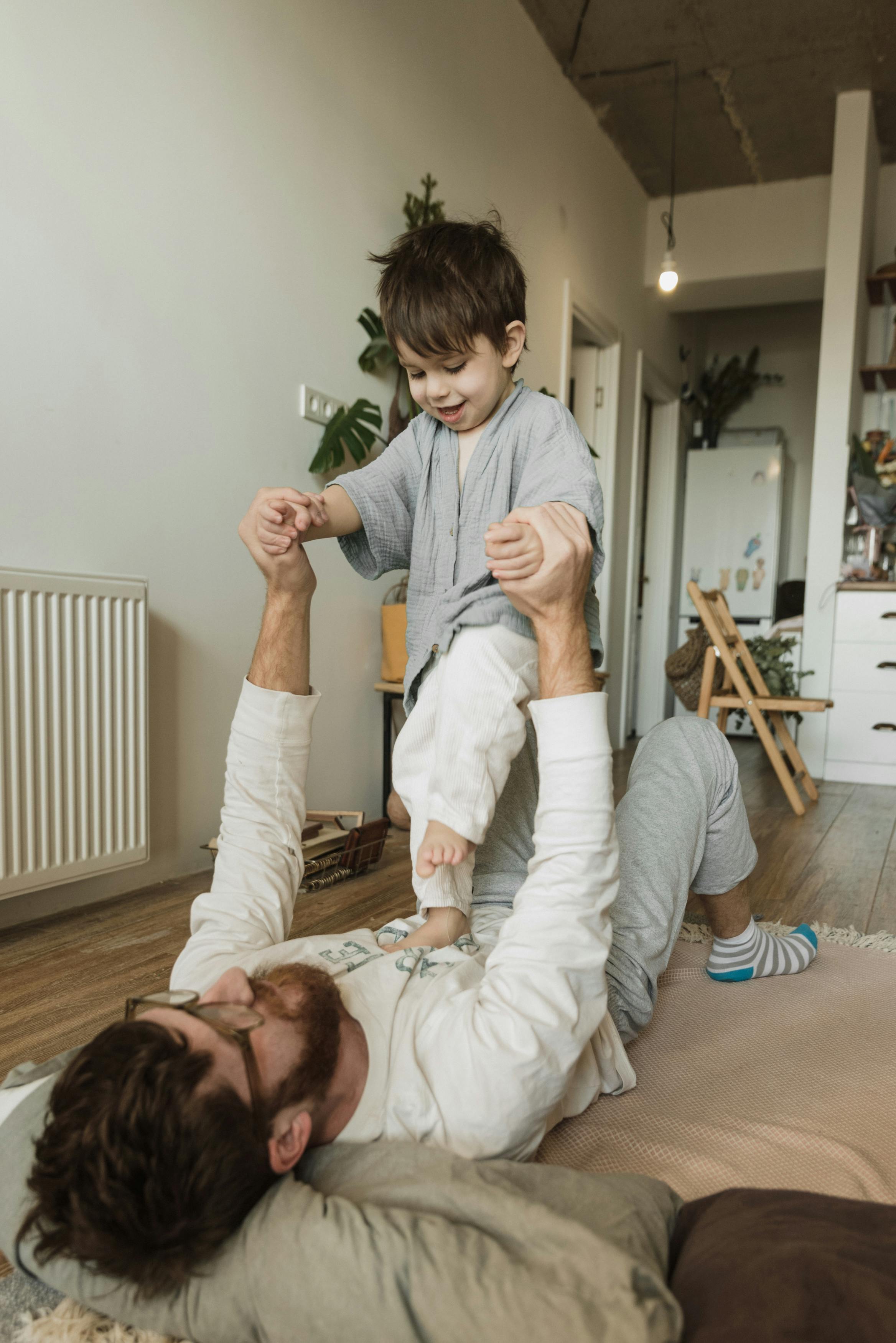 Father and Son Playing Together · Free Stock Photo