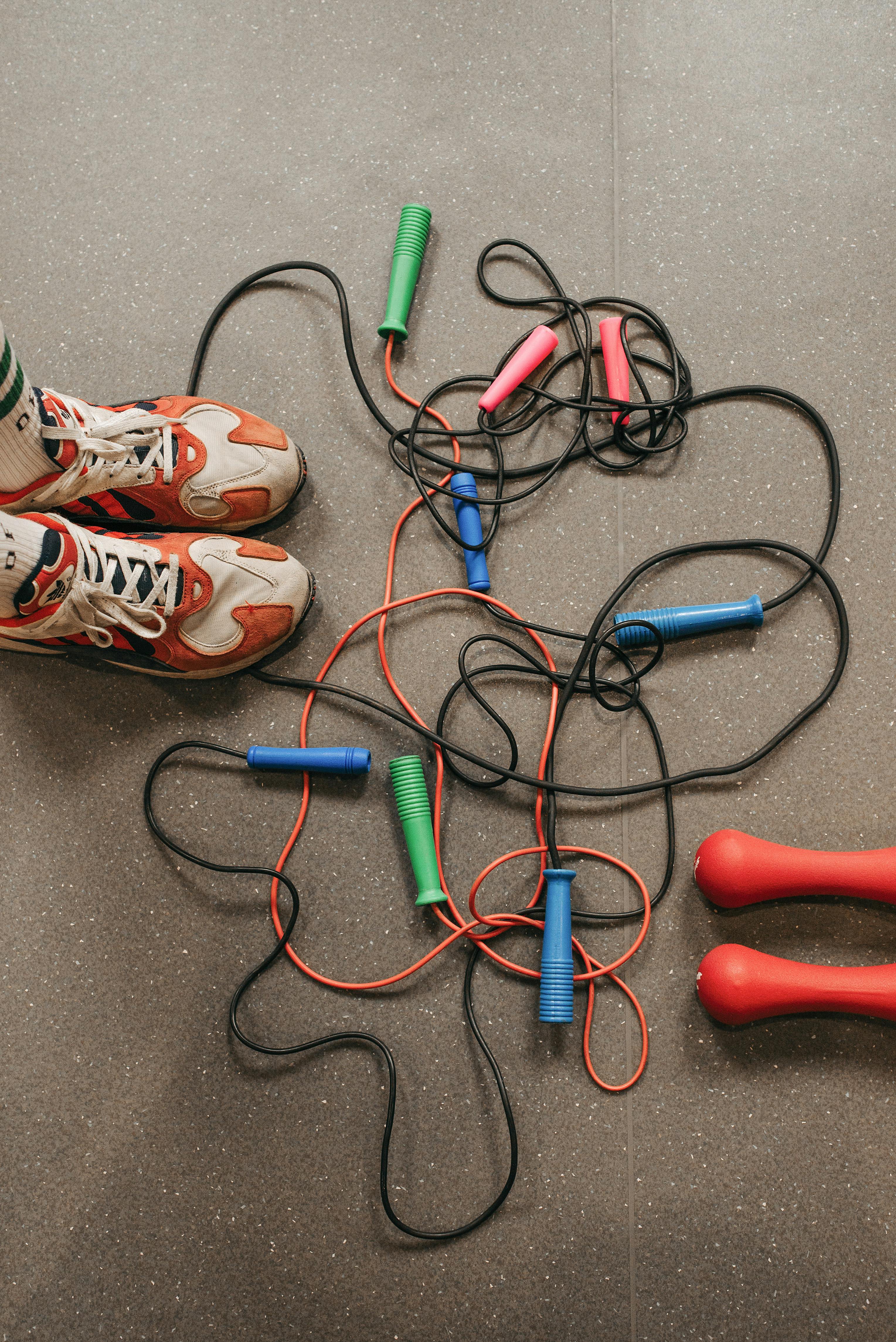 Close Up Photo of Jump Ropes on Floor Tiles · Free Stock Photo