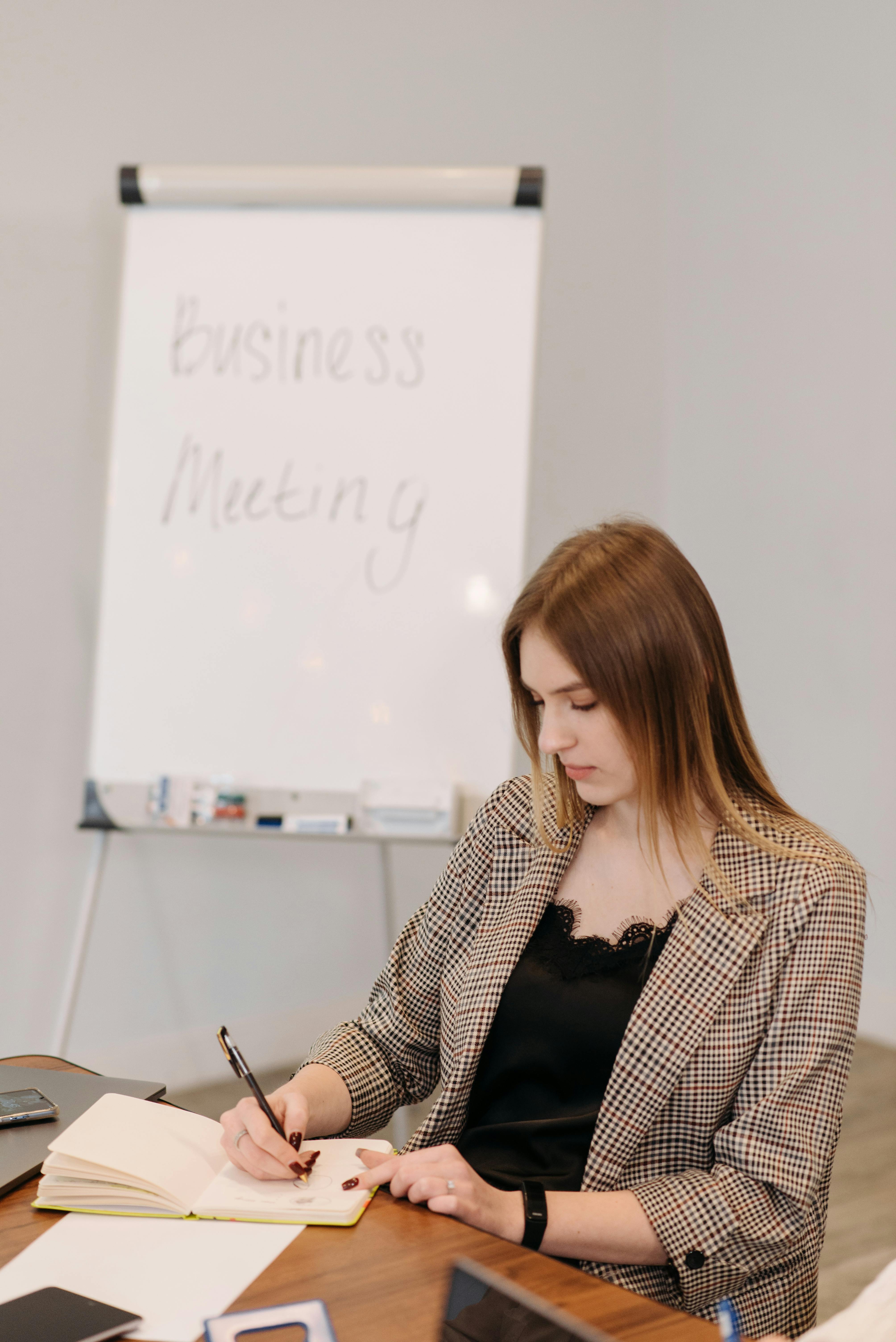 A Woman Making Notes · Free Stock Photo