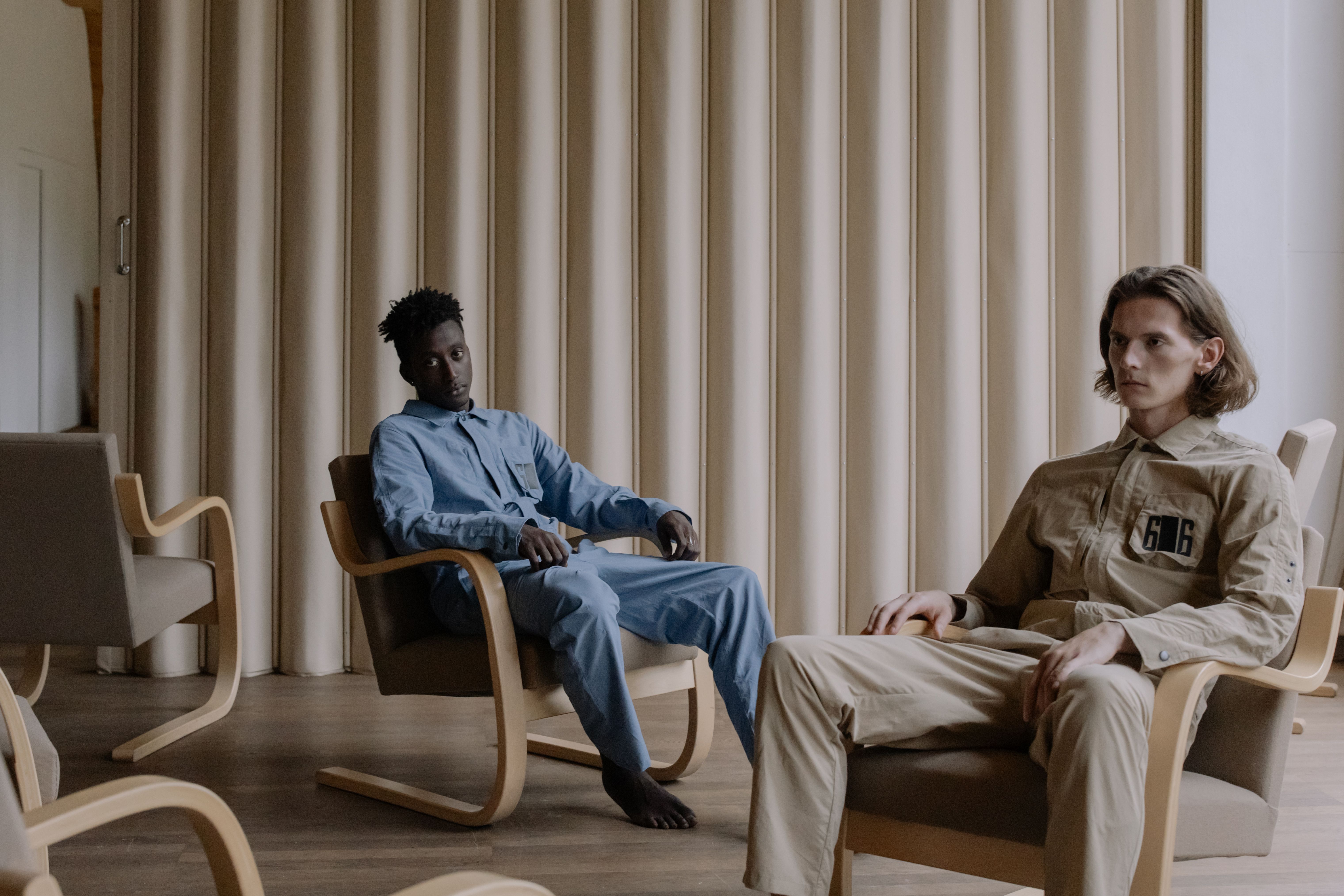 Men Sitting on Chair · Free Stock Photo