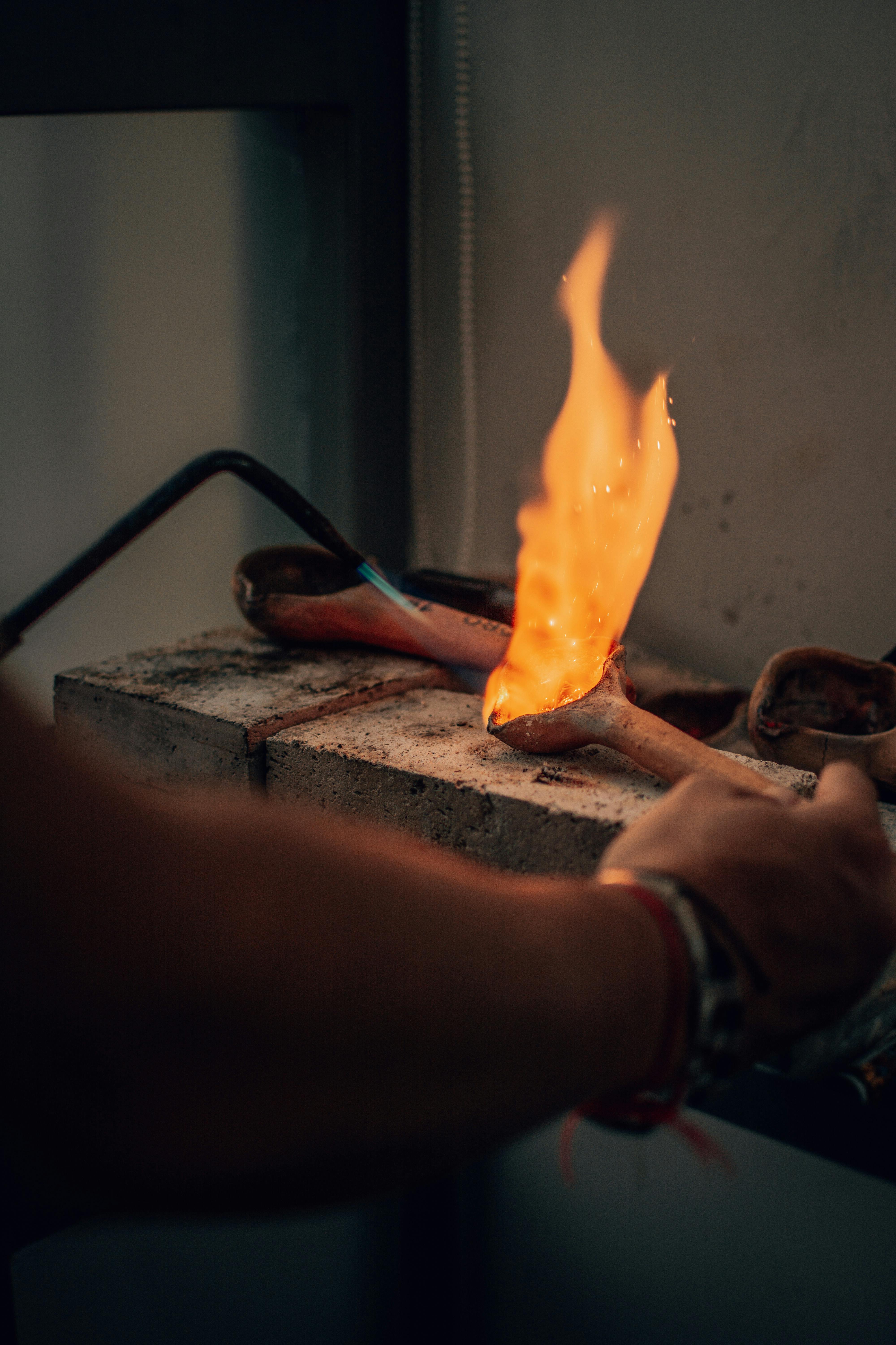 A Person Holding Spoon with Fire · Free Stock Photo