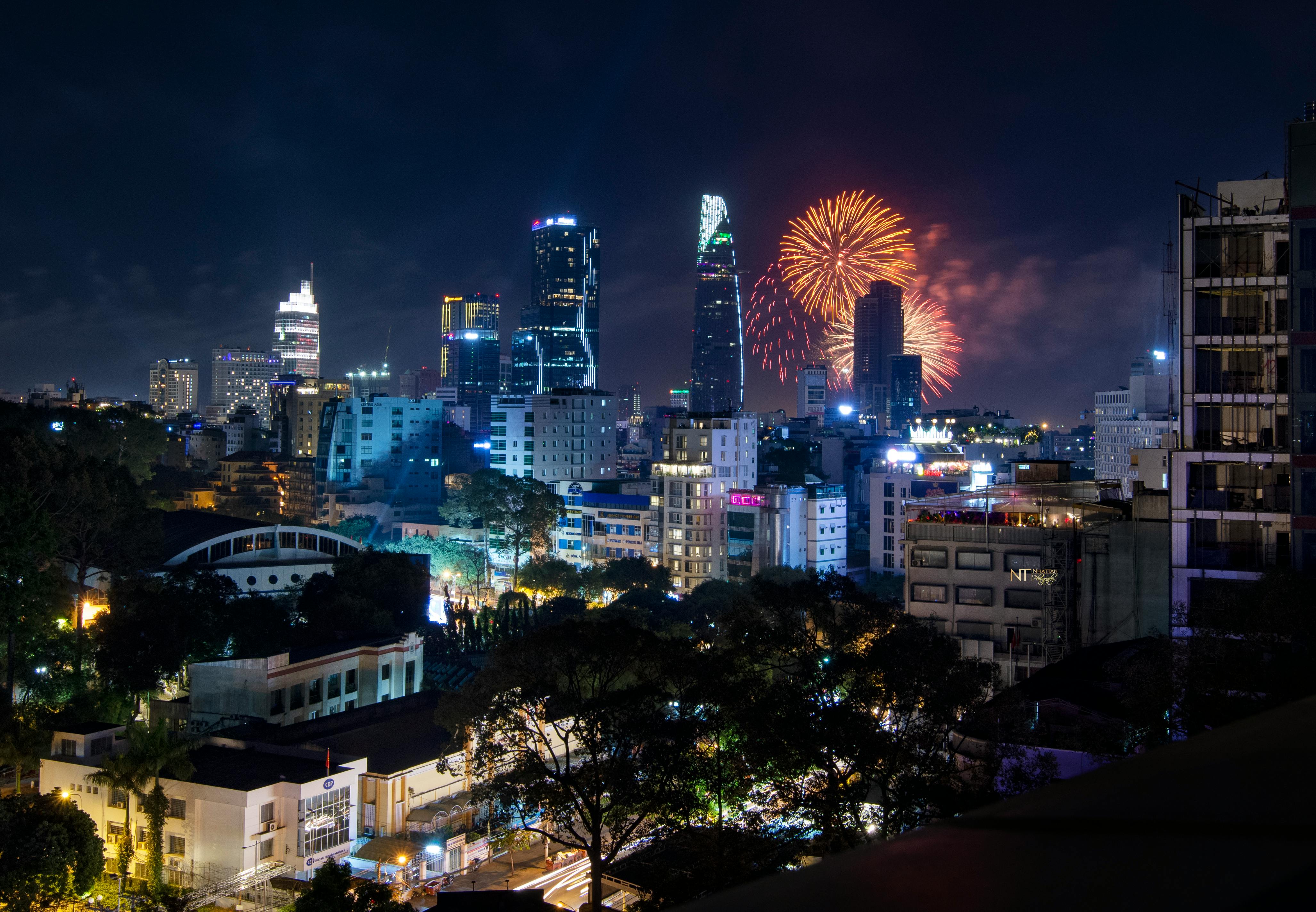 Cityscape with Fireworks Display · Free Stock Photo