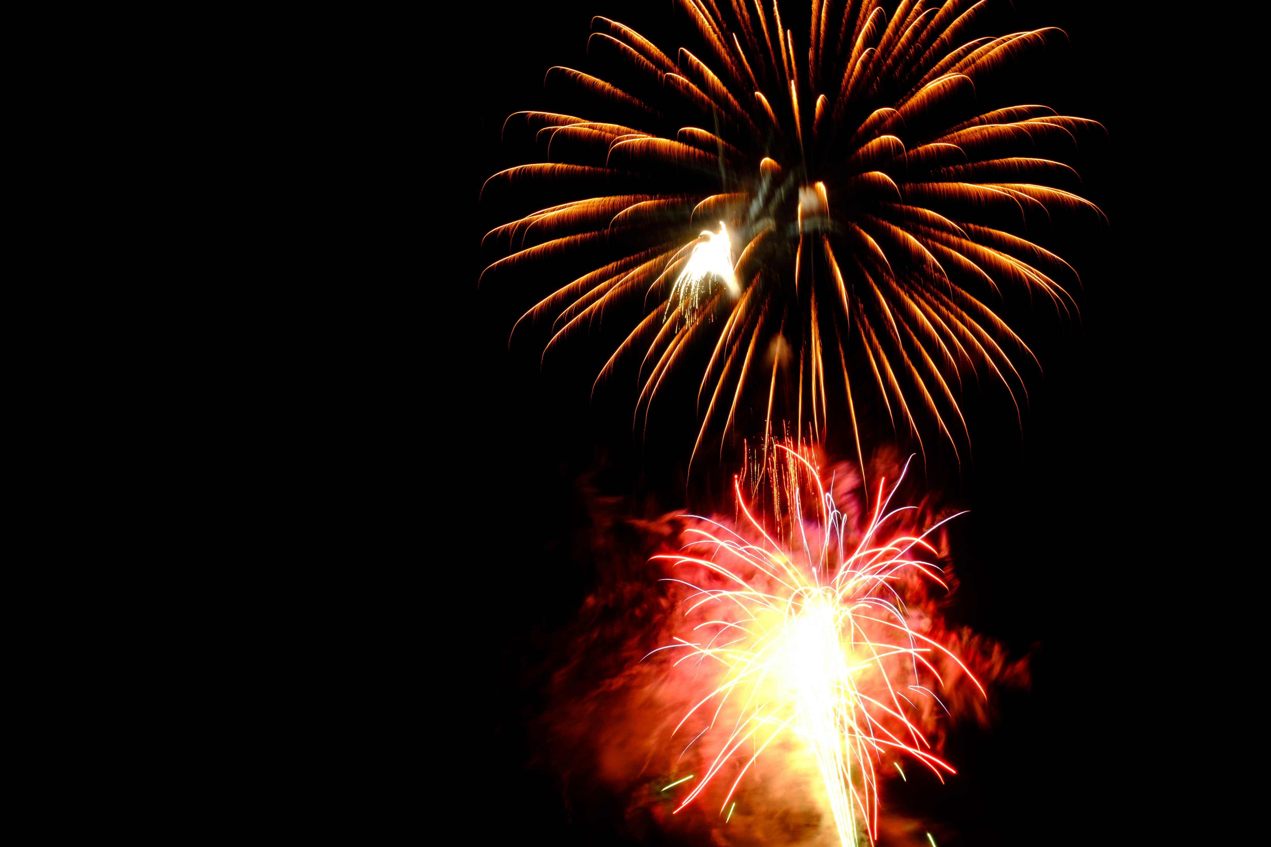 Red and Brown Fireworks Display Photo · Free Stock Photo