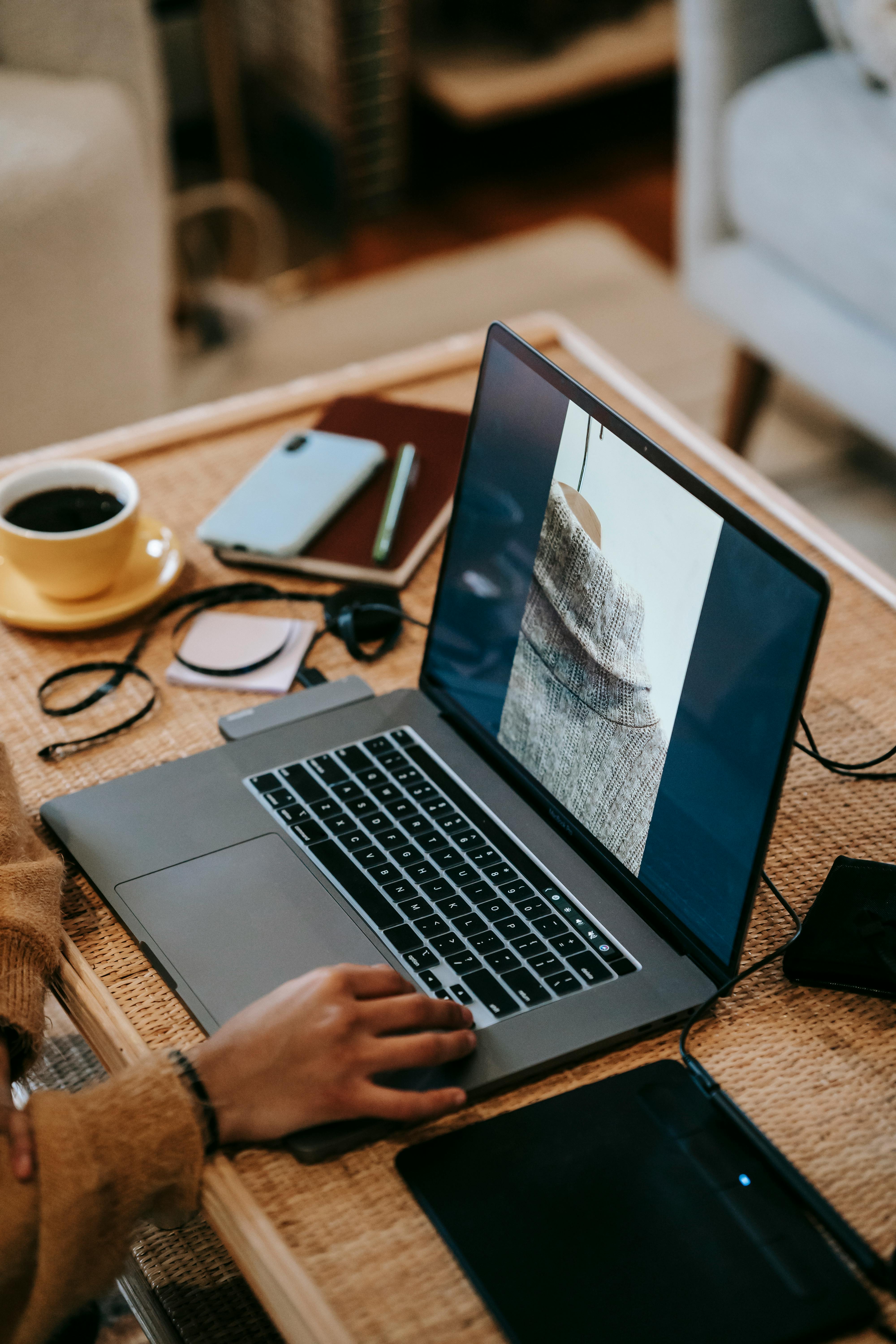 Hand on a Laptop · Free Stock Photo