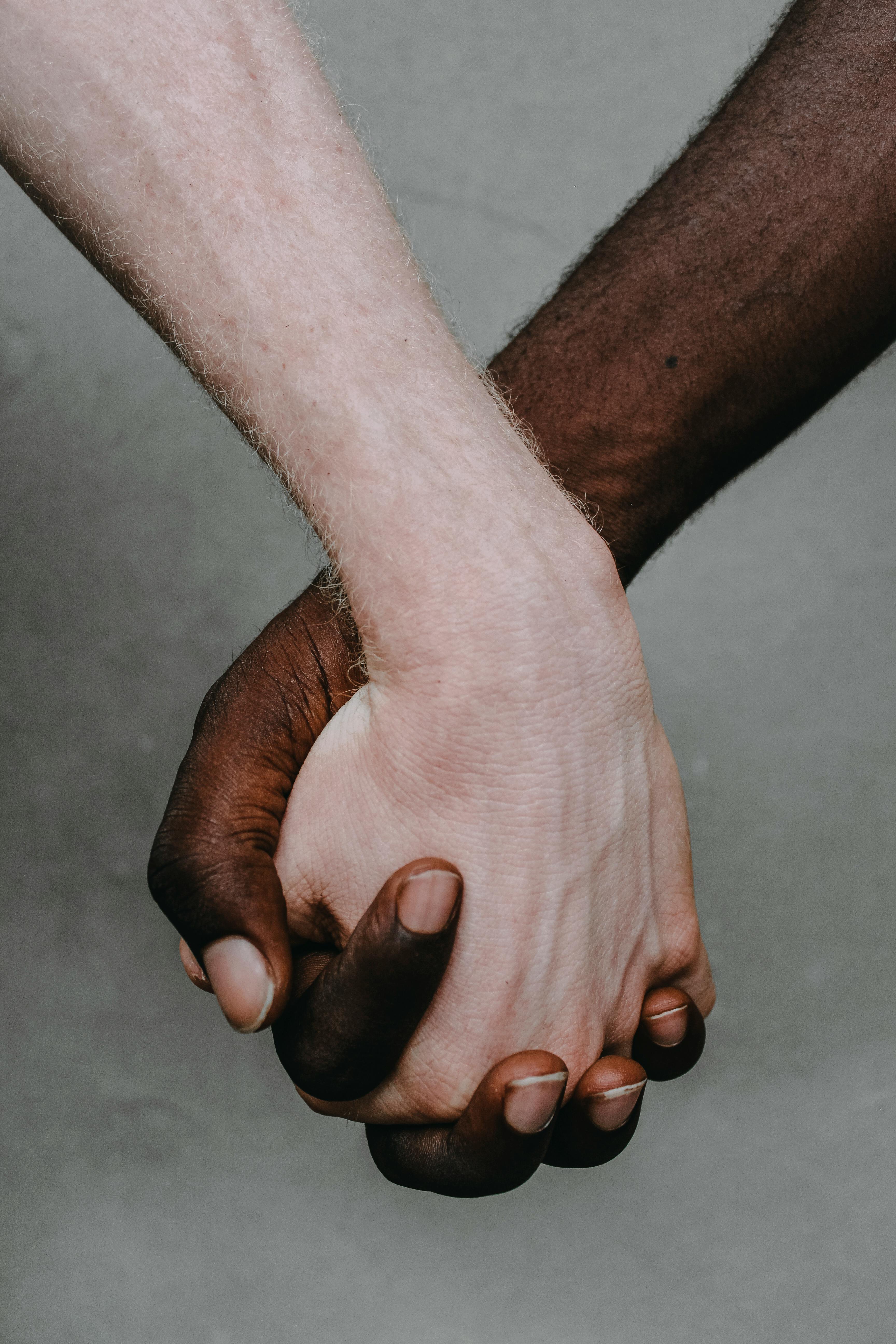 Close-up of People Holding Hands · Free Stock Photo