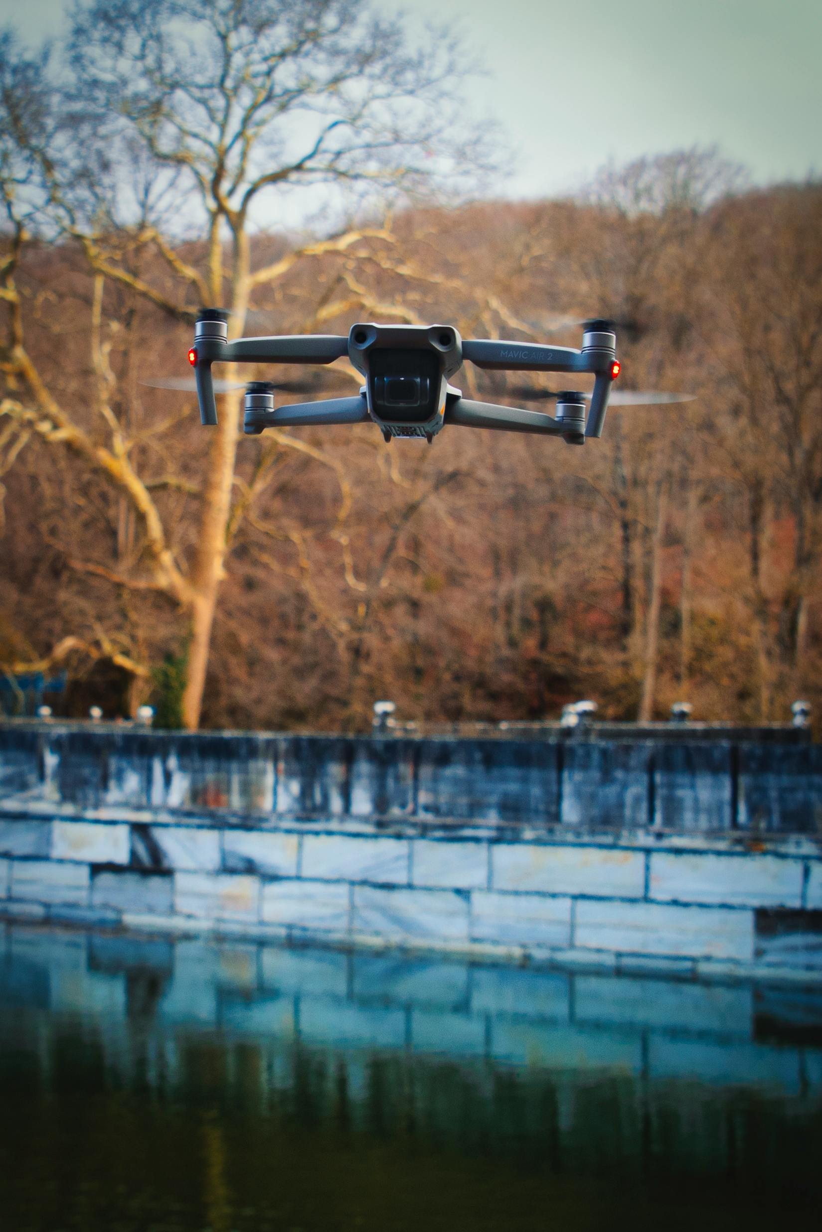 A Drone Camera Hovering Over the Lake · Free Stock Photo