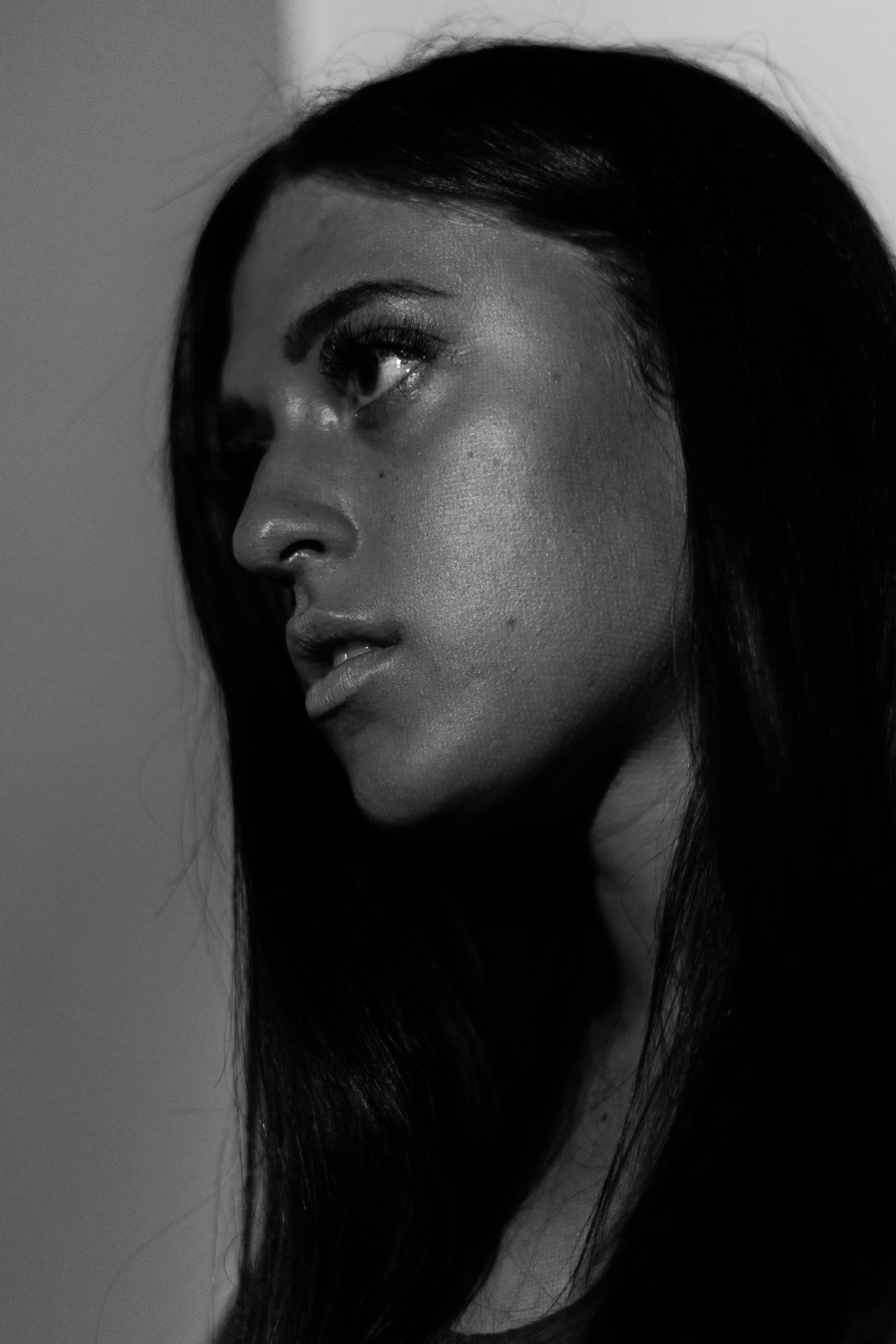 Grayscale Photo of a Woman Face · Free Stock Photo