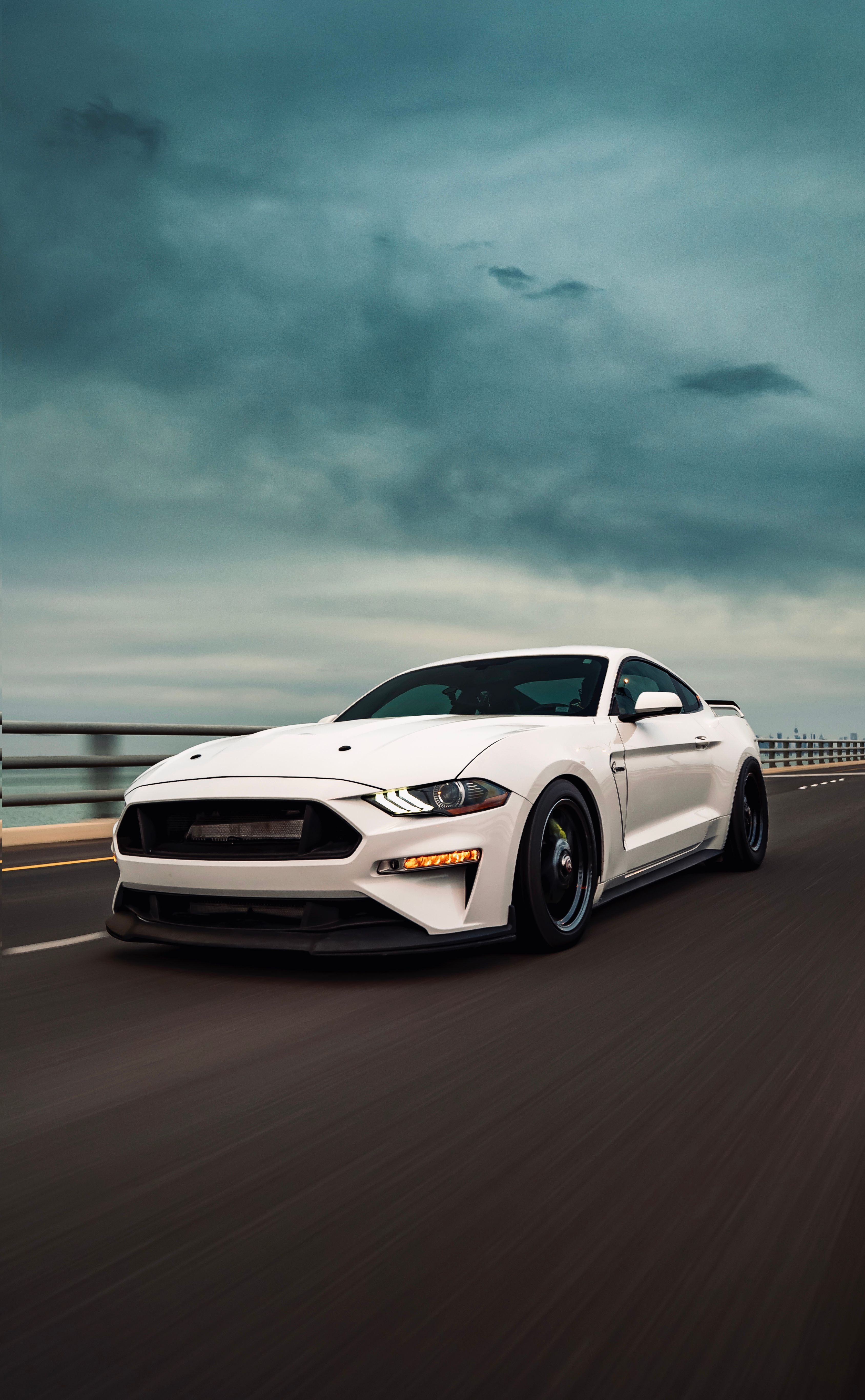 Luxury Car under Cloudy Sky · Free Stock Photo