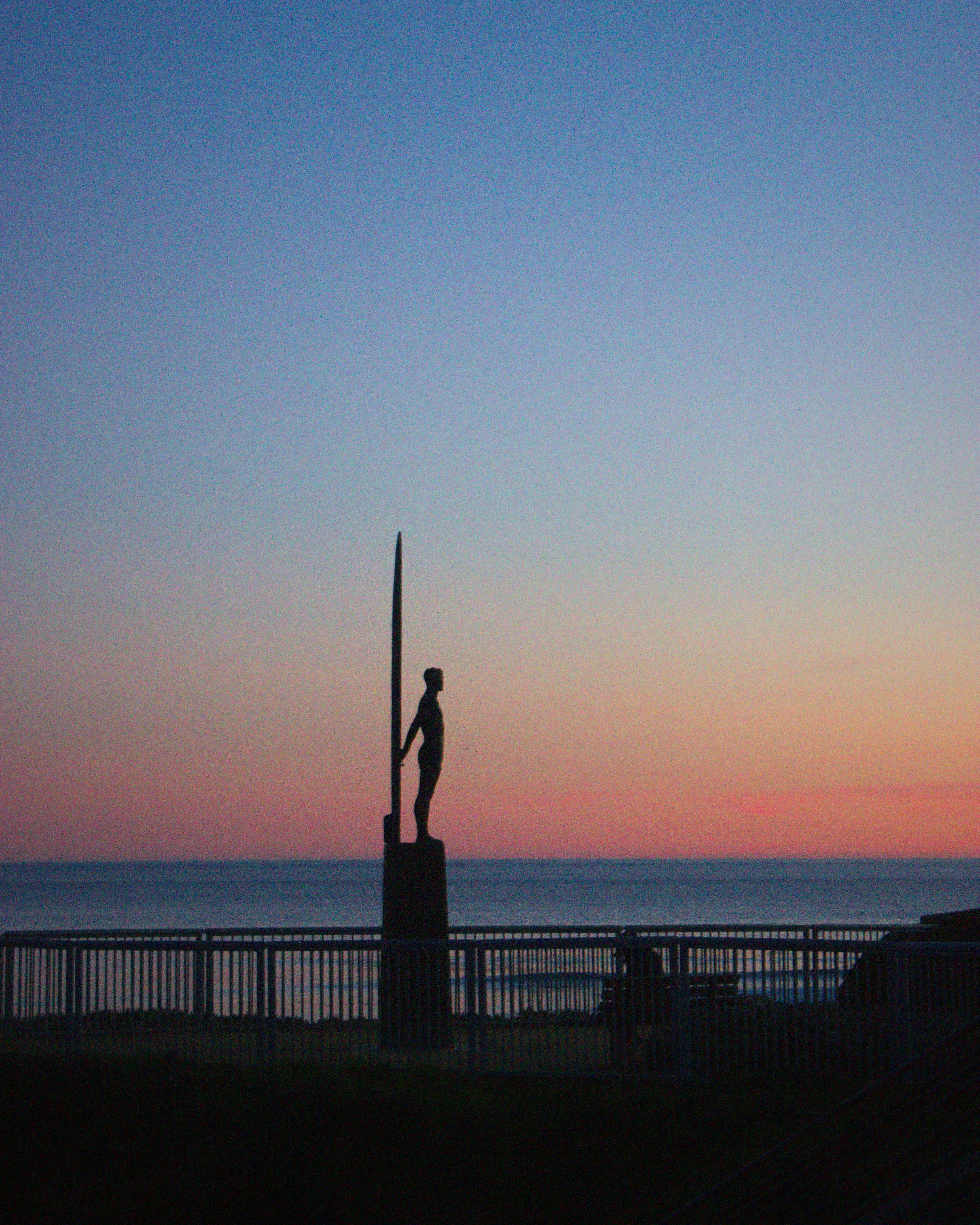 Sculpture Silhouette on Sea Landscape · Free Stock Photo