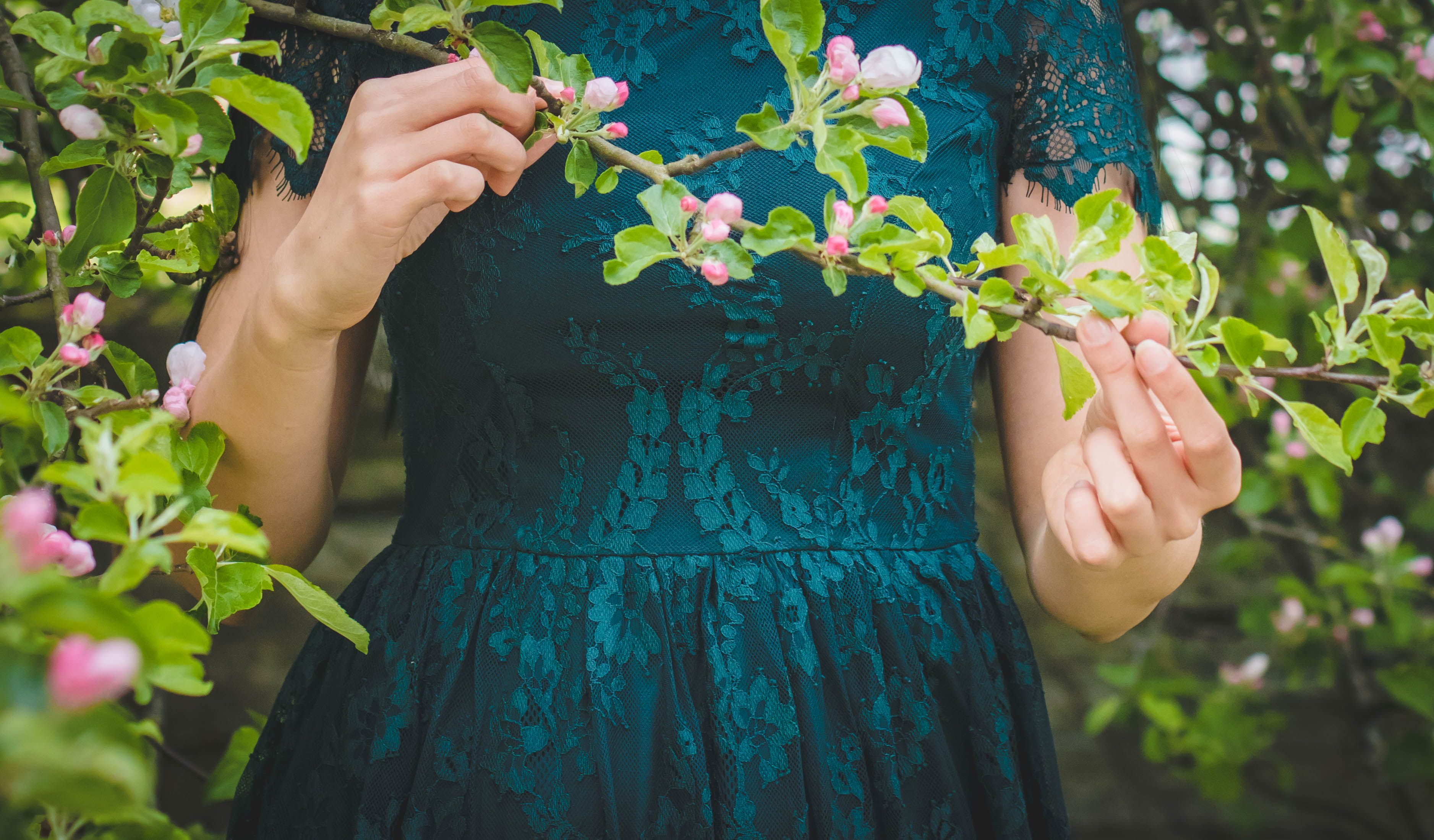 Woman in Dress Standing Beside Tree · Free Stock Photo