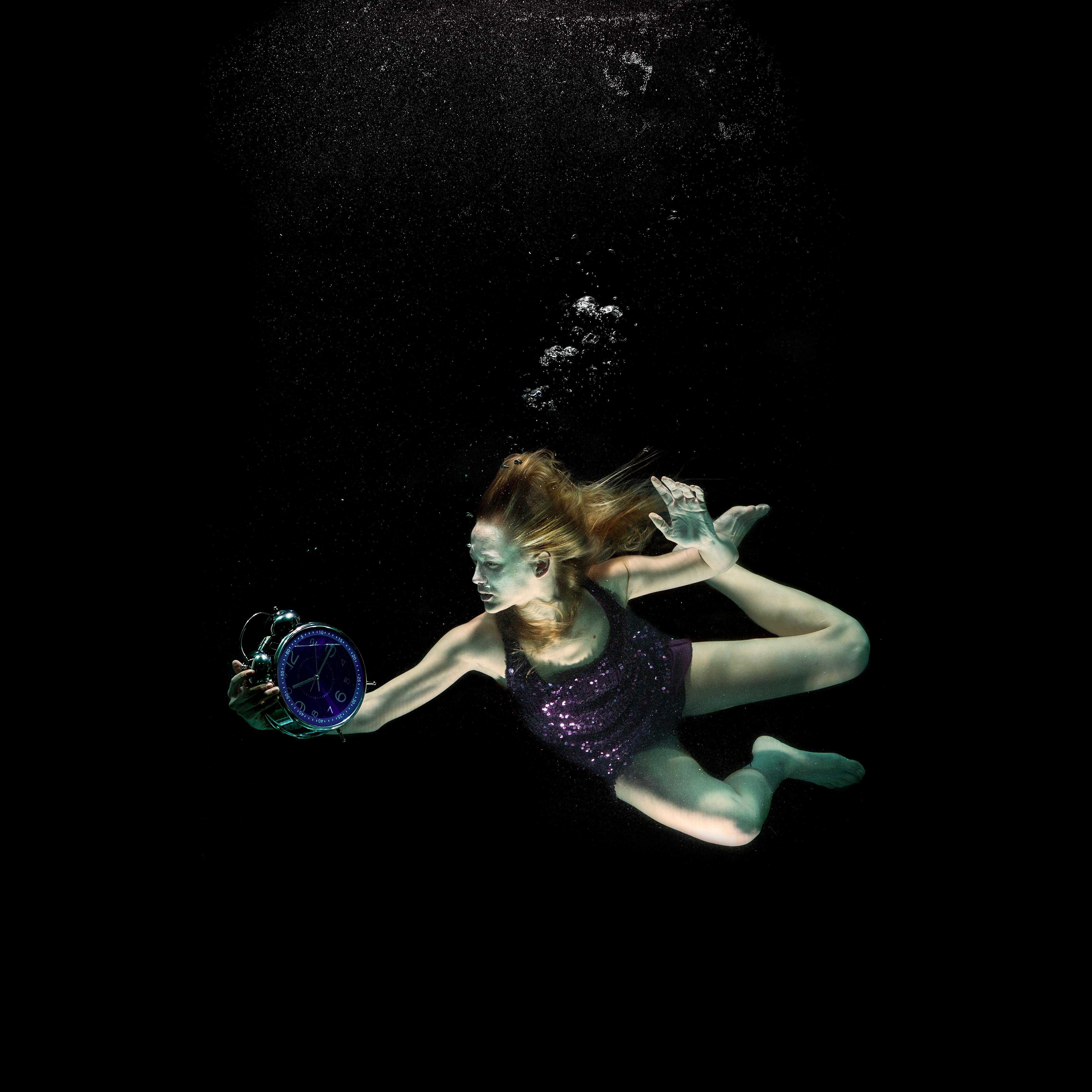 Woman floating Underwater · Free Stock Photo