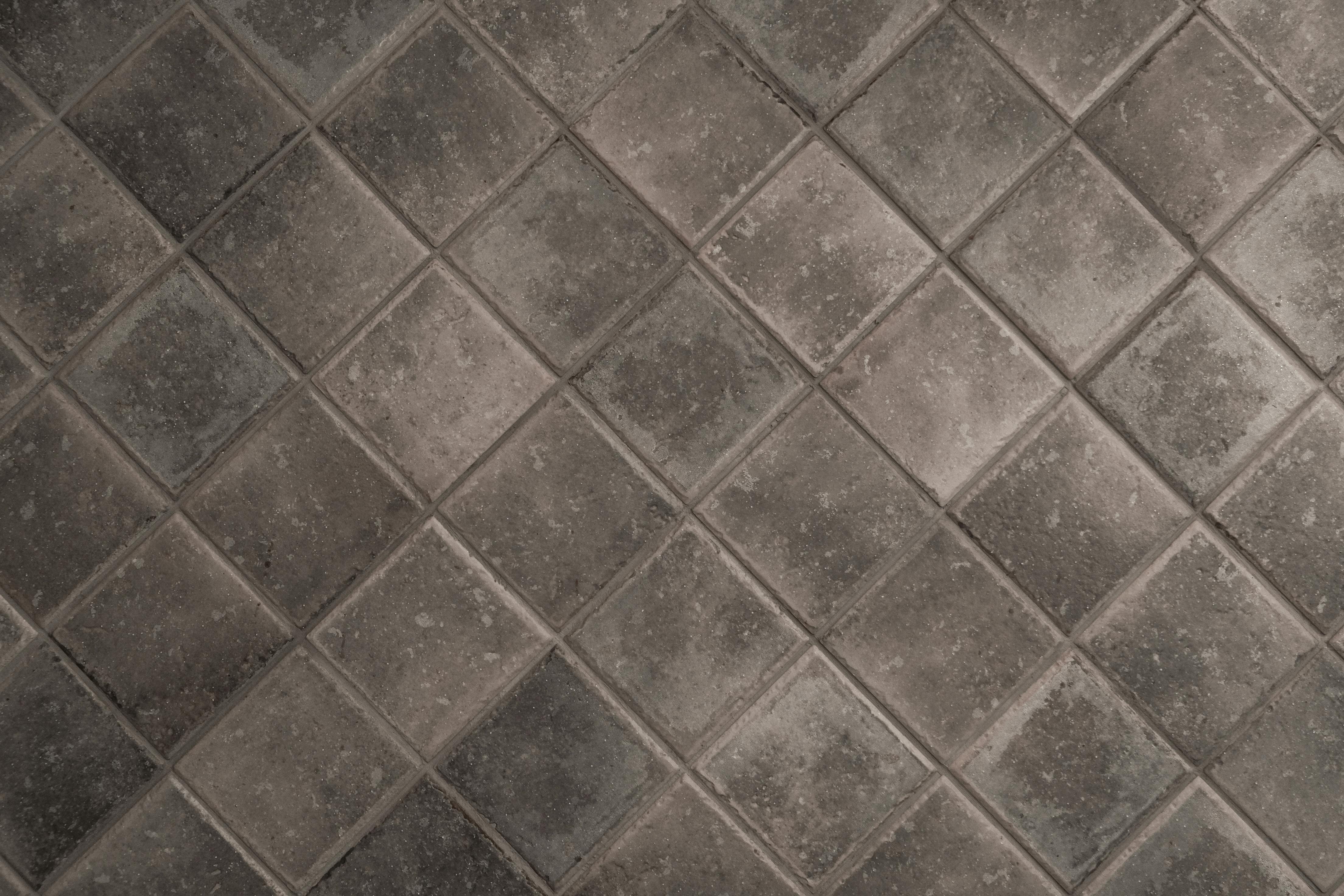 A Gray Tiled Surface with Diamond Shape Pattern · Free Stock Photo