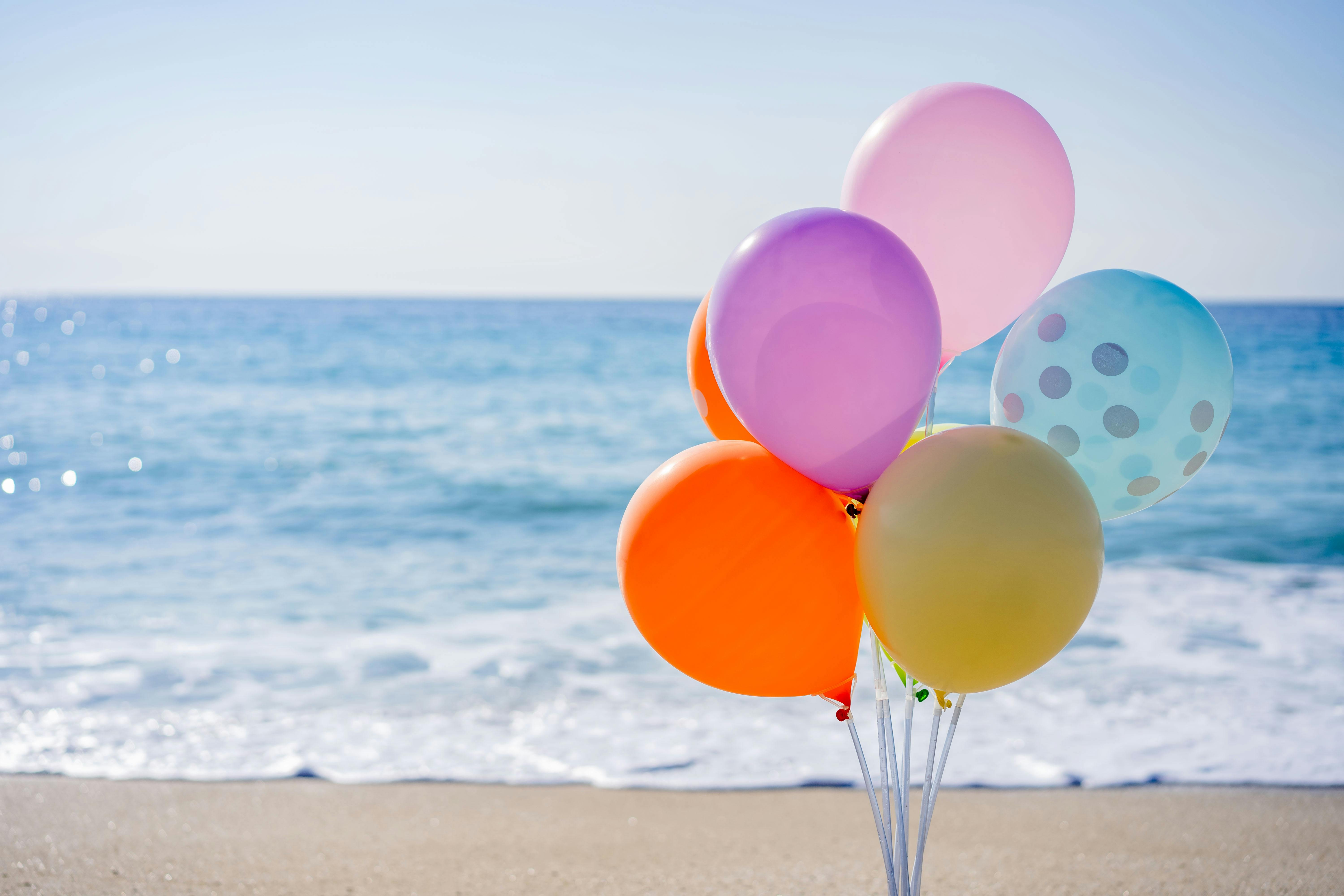 Colorful Balloons on Beach · Free Stock Photo