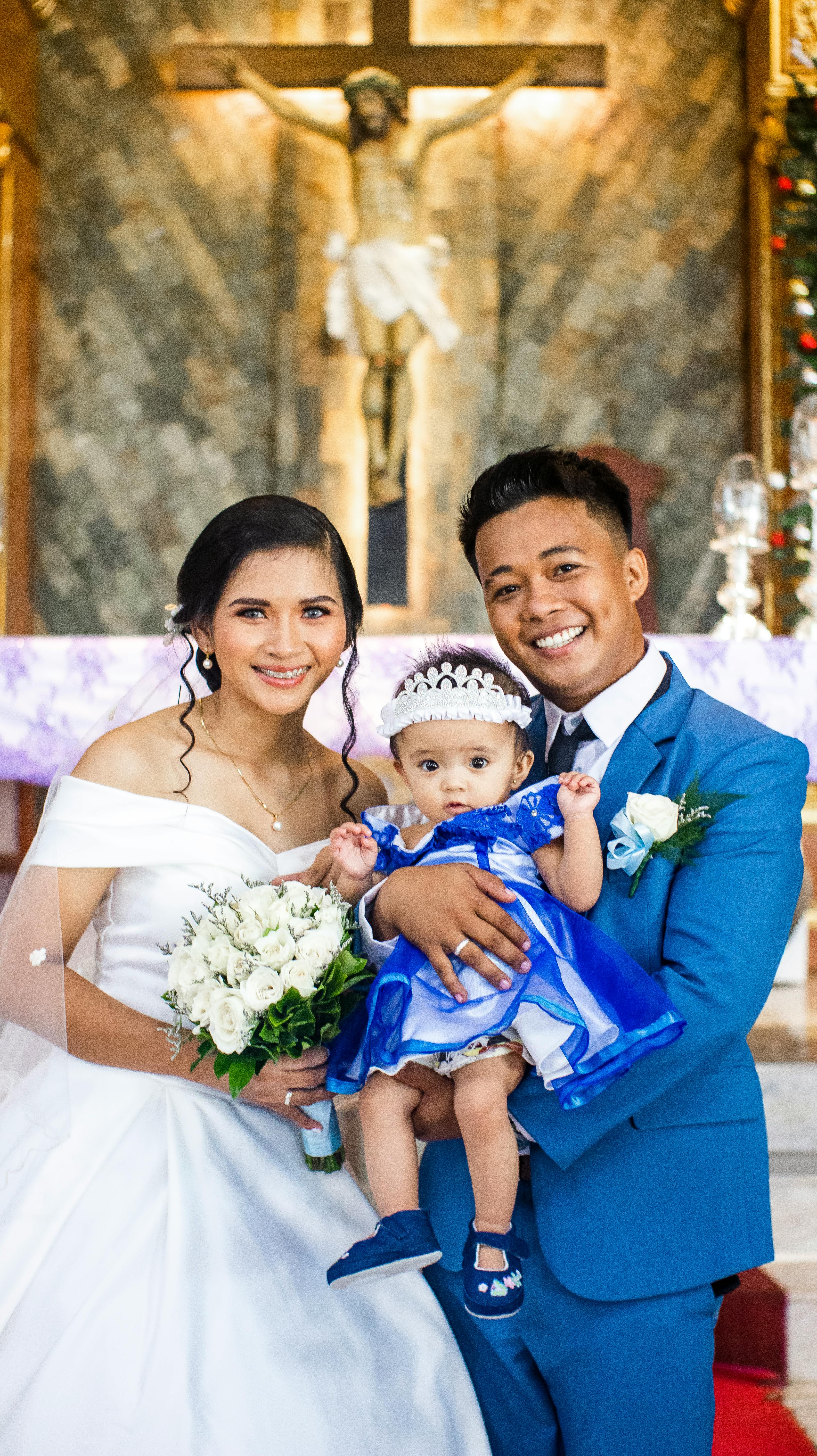 Little bride and groom in bright hall · Free Stock Photo