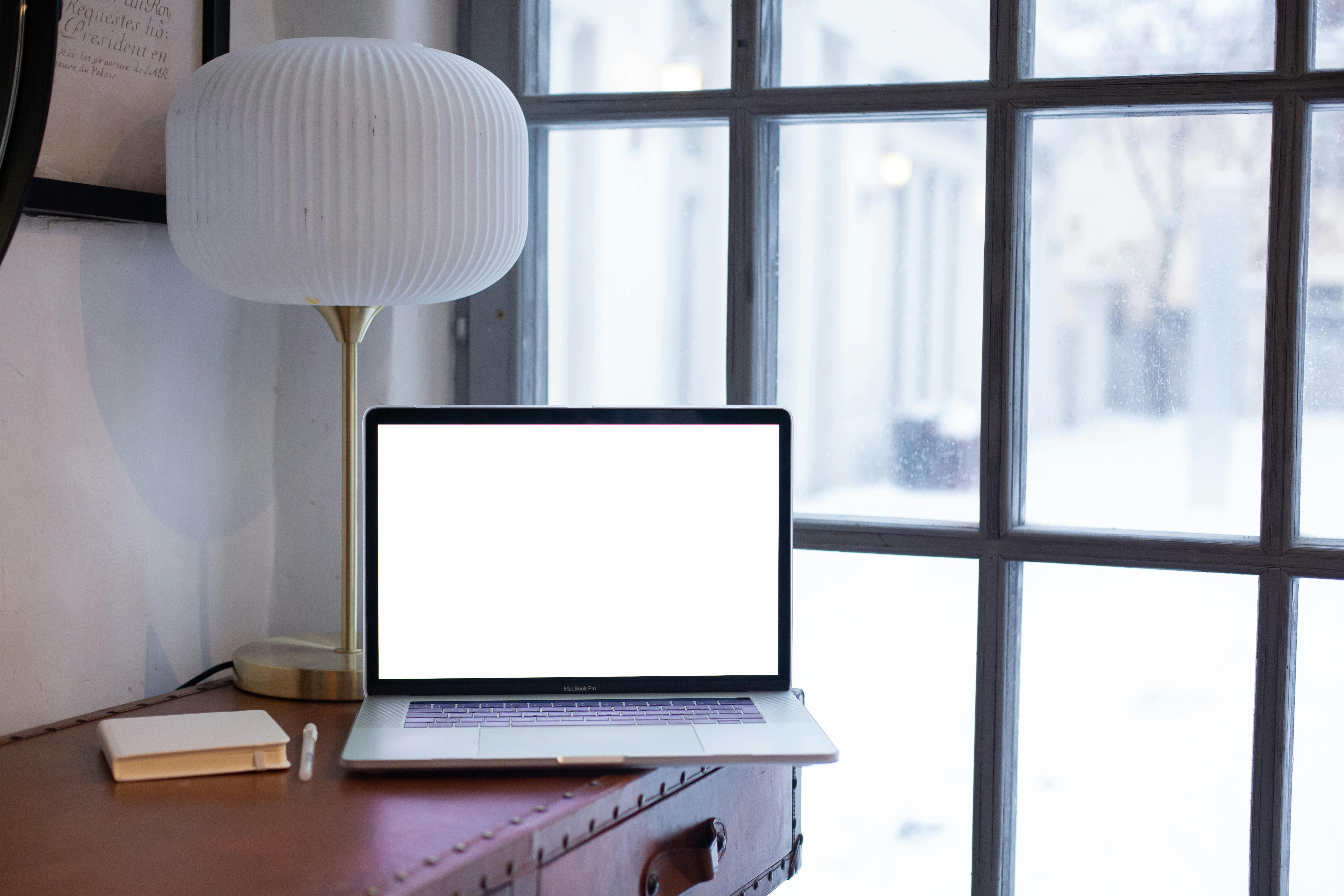 A Laptop With a White Screen · Free Stock Photo