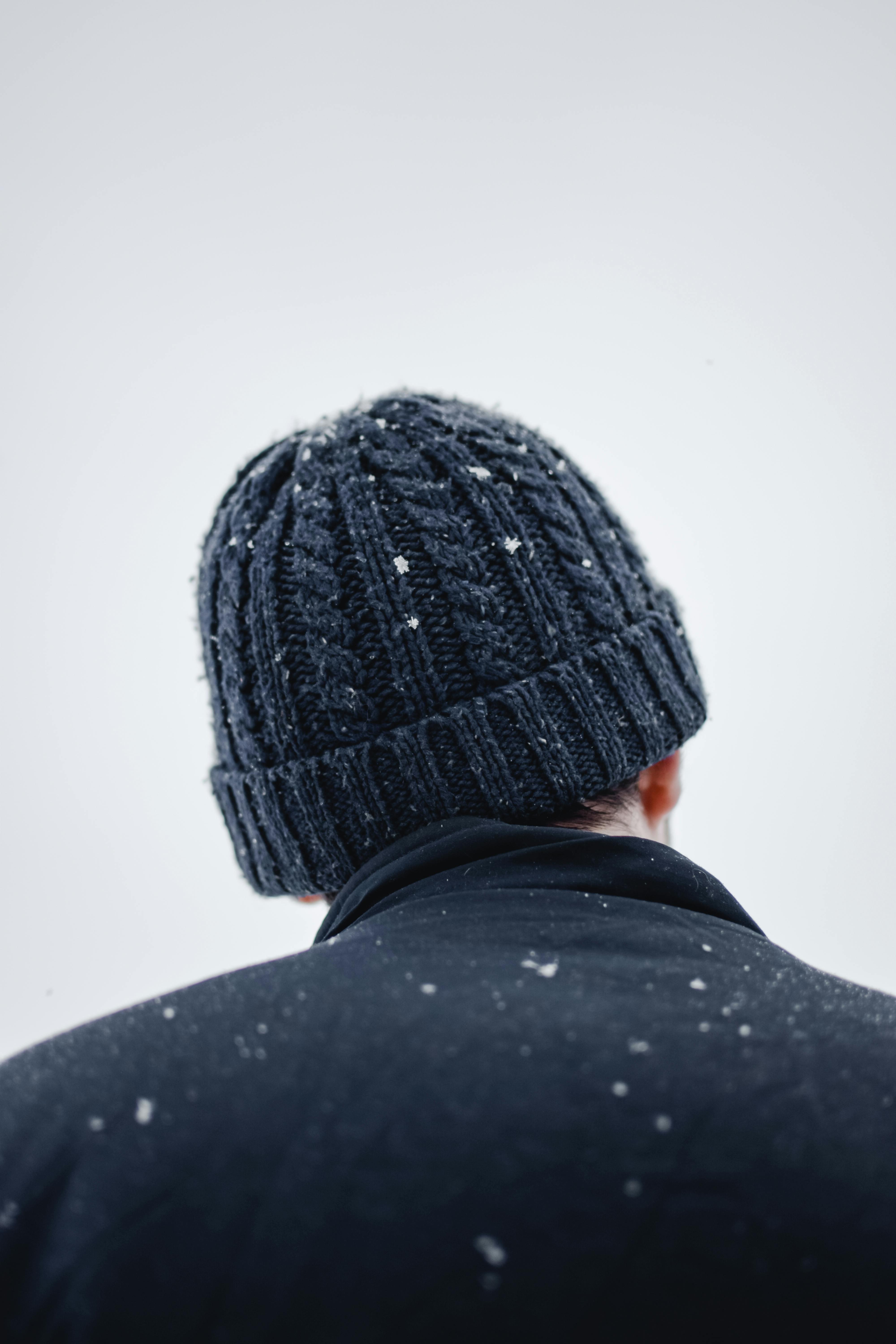 Back View of Person Wearing Gray Knitted Beanie Hat · Free Stock Photo