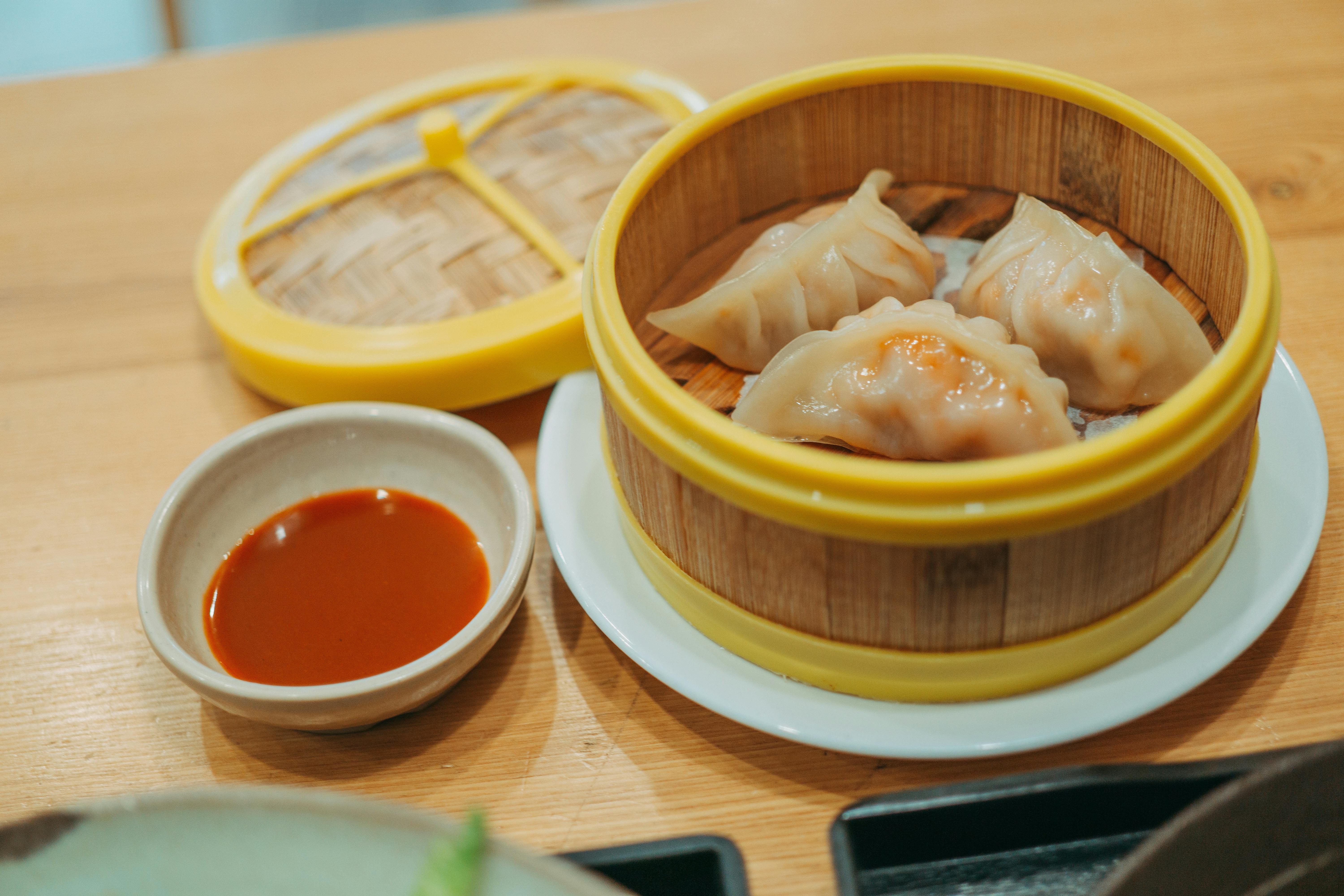 Fried Spring Rolls and Dumplings on Top of Tray · Free Stock Photo