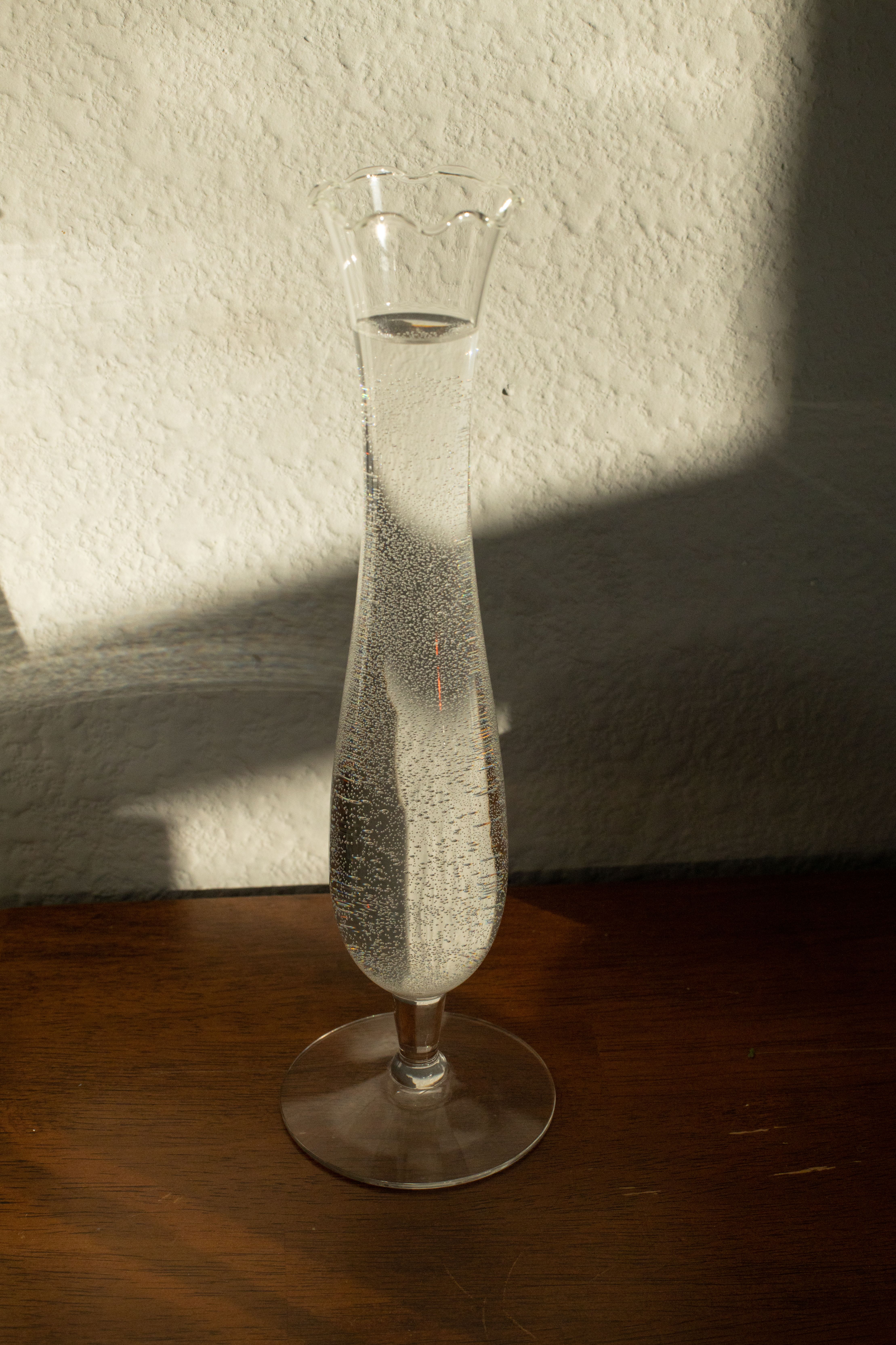 Classy glass of water served on wooden table · Free Stock Photo