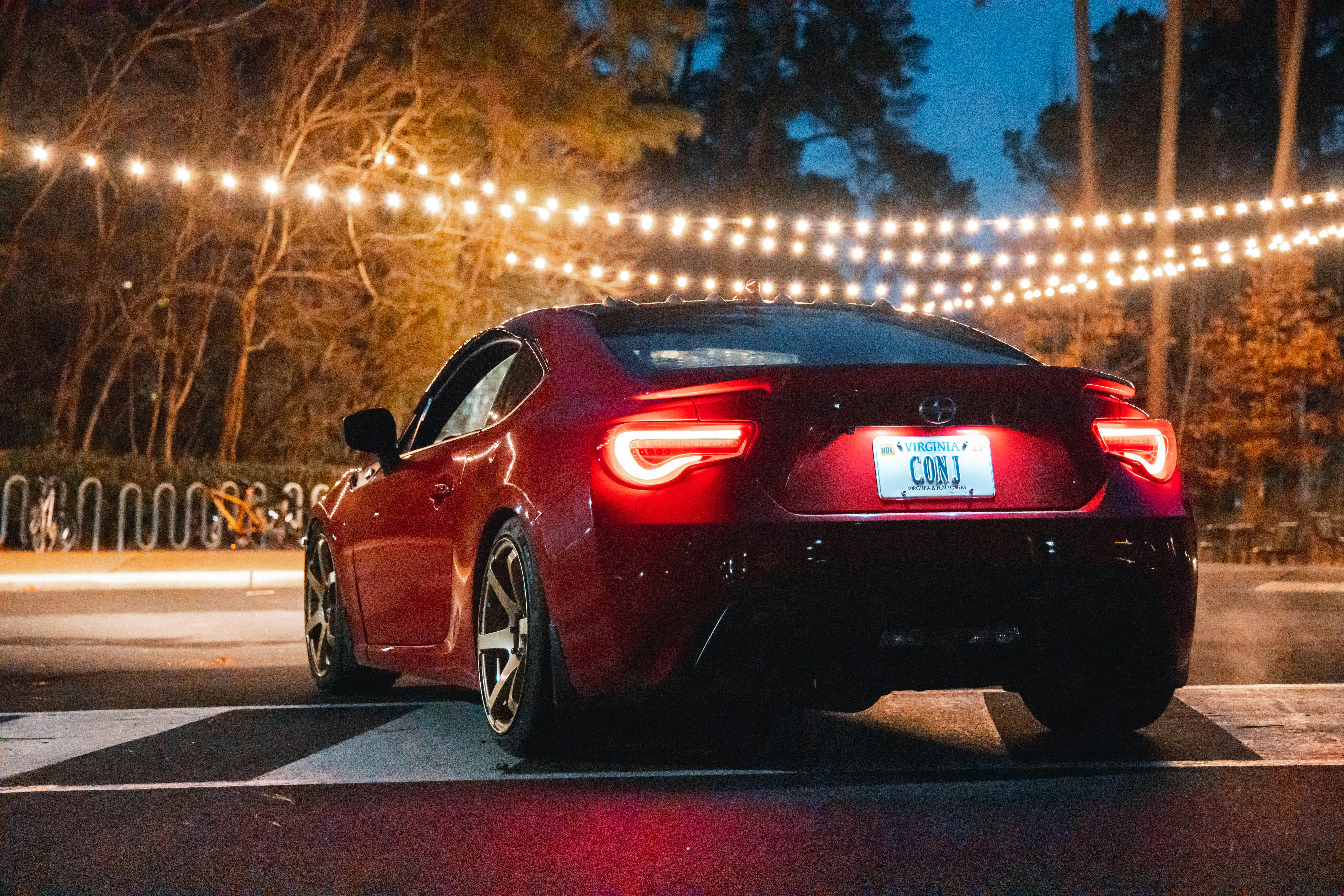 A Back View of a Red Car · Free Stock Photo