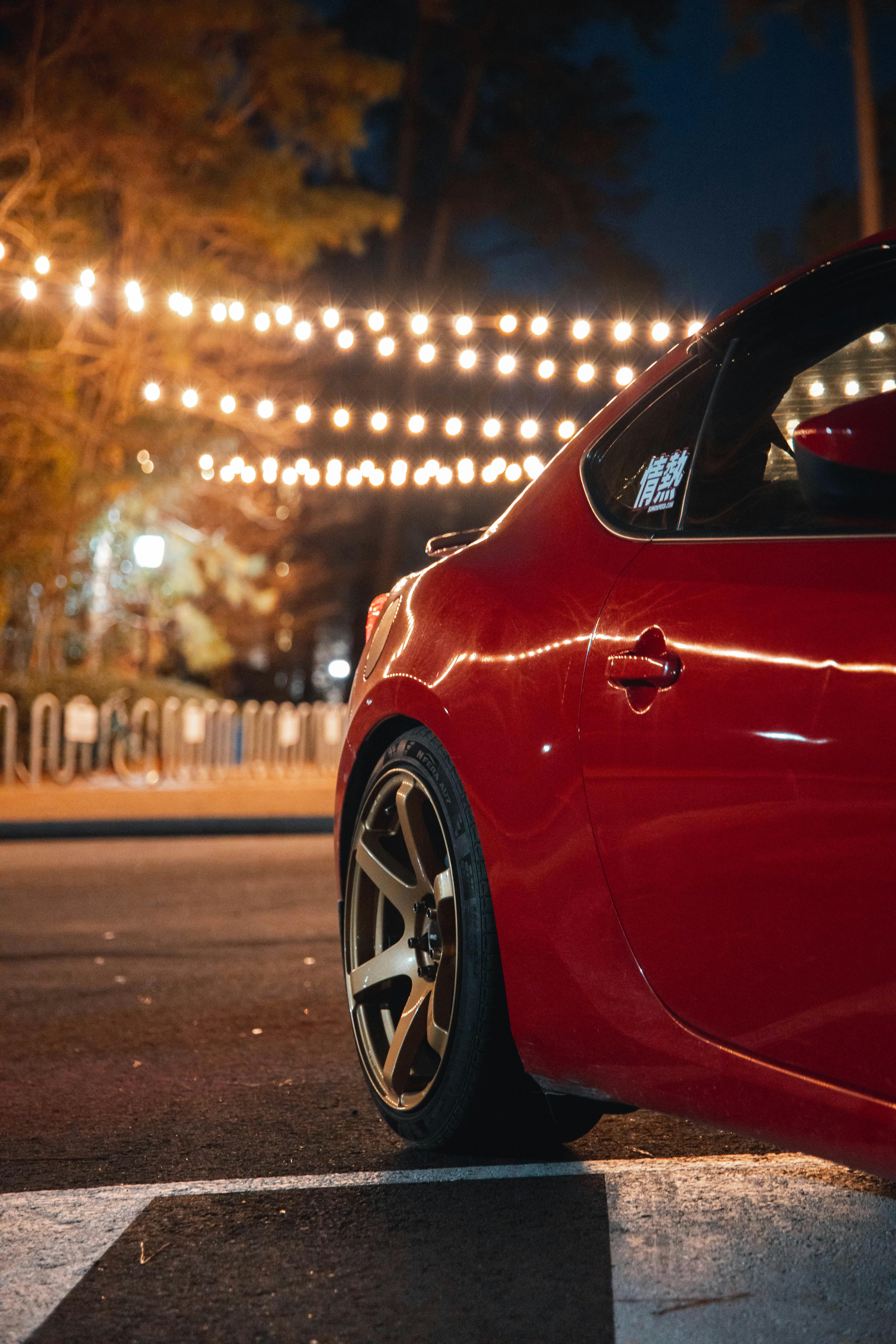 Red Car on the Road during Night Time · Free Stock Photo