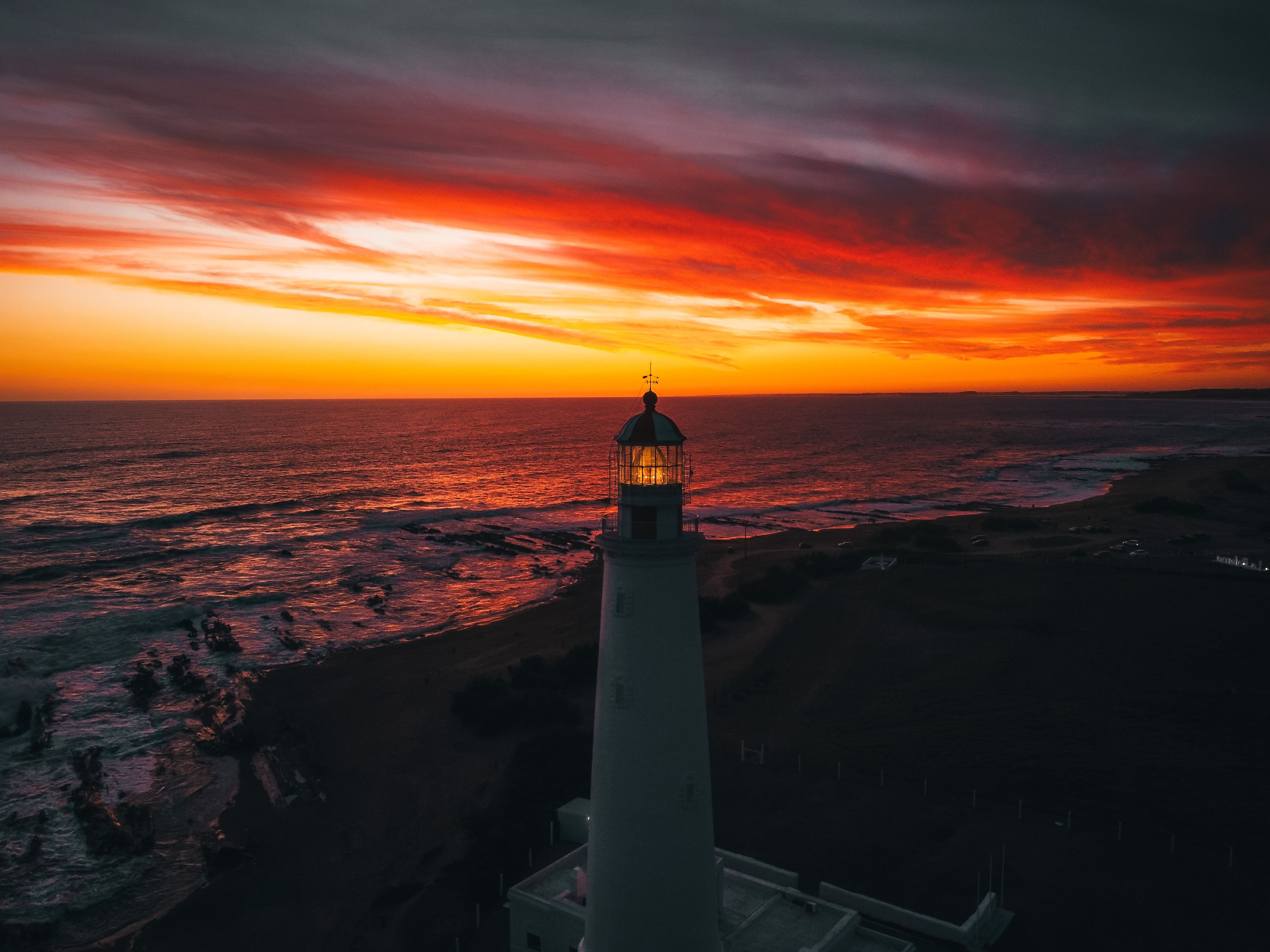Lighthouse Tower on a Rock Formation · Free Stock Photo