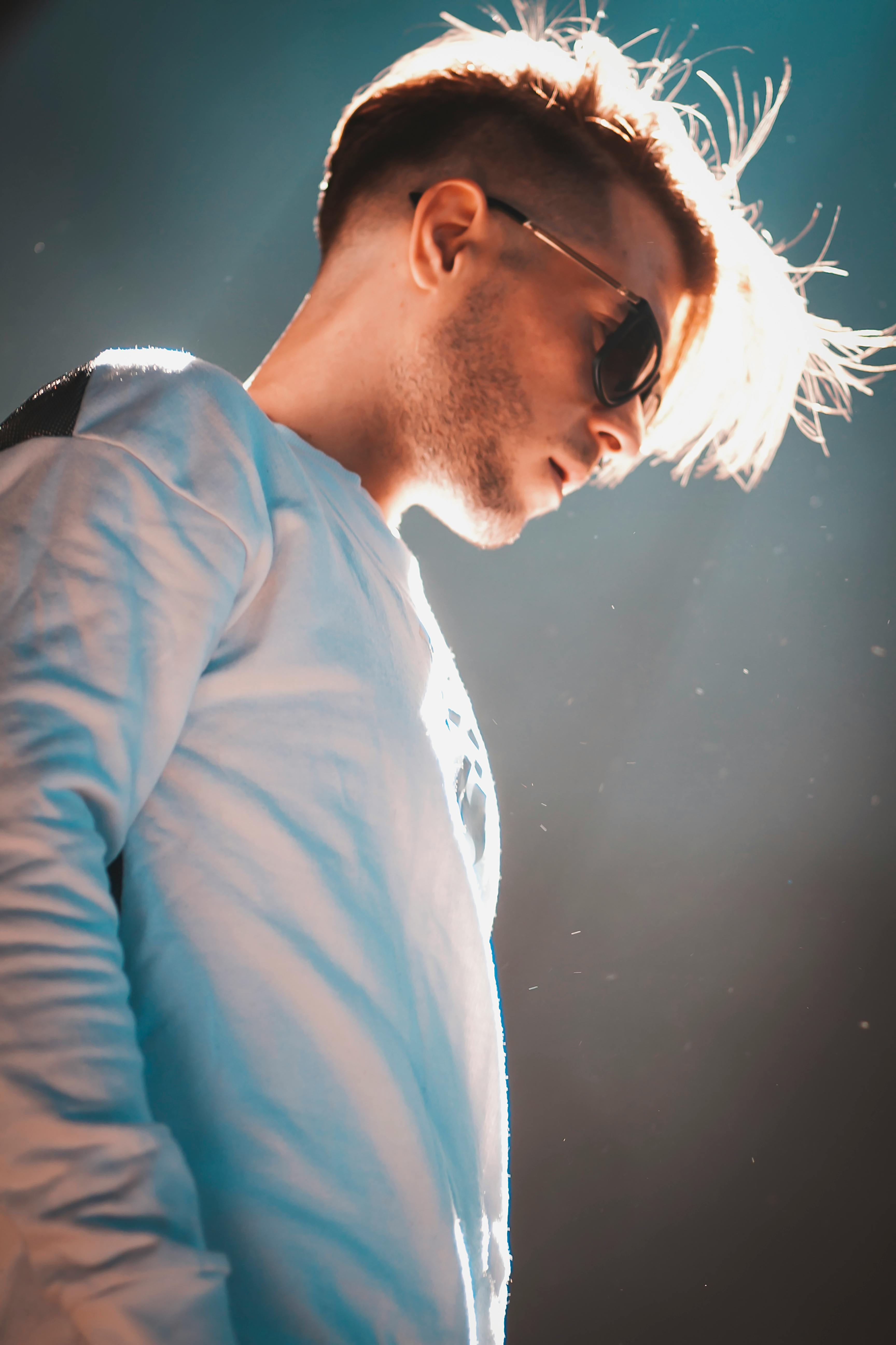 Low Angle Shot of Smiling Woman · Free Stock Photo