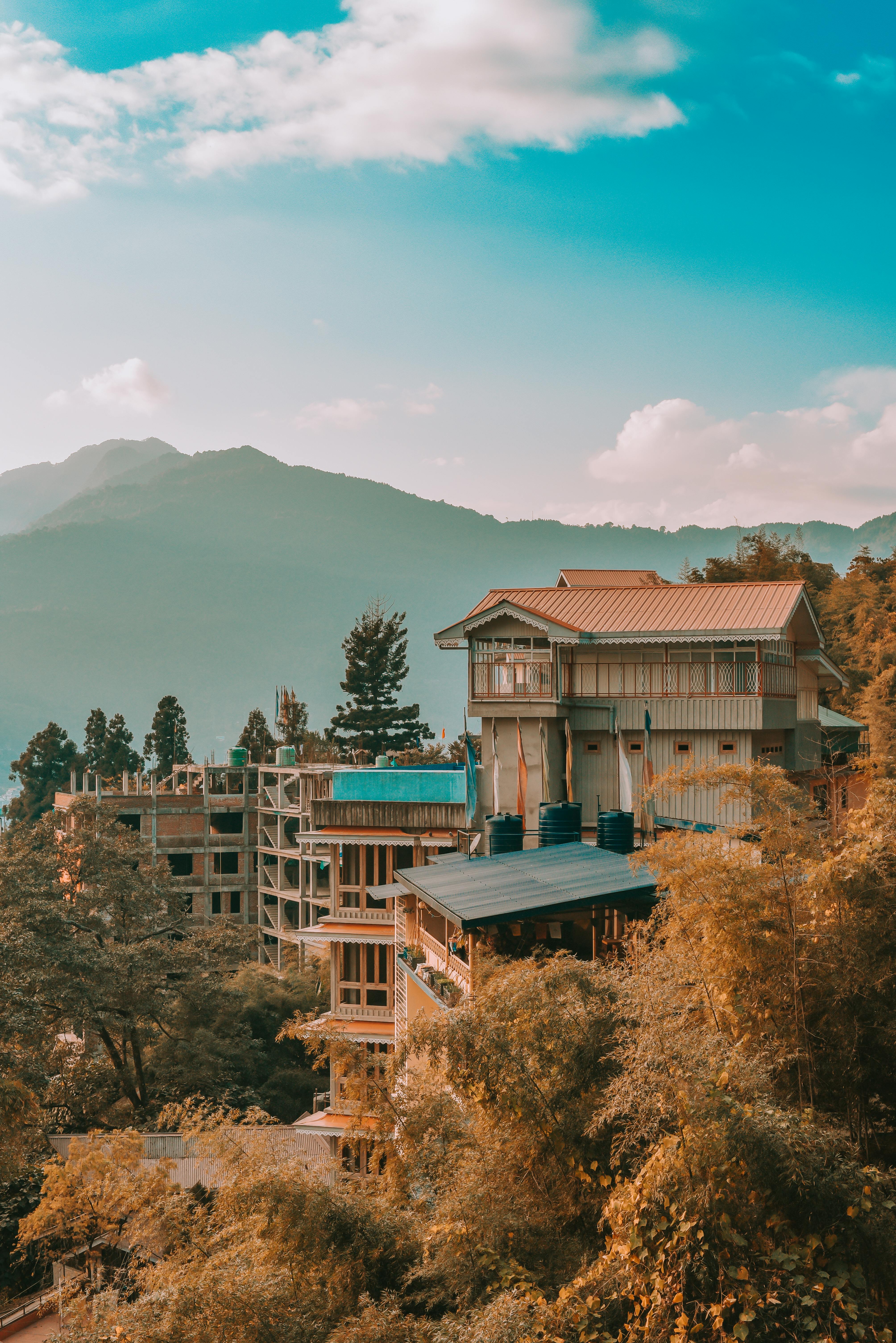 Buildings on Hills in Mountains · Free Stock Photo