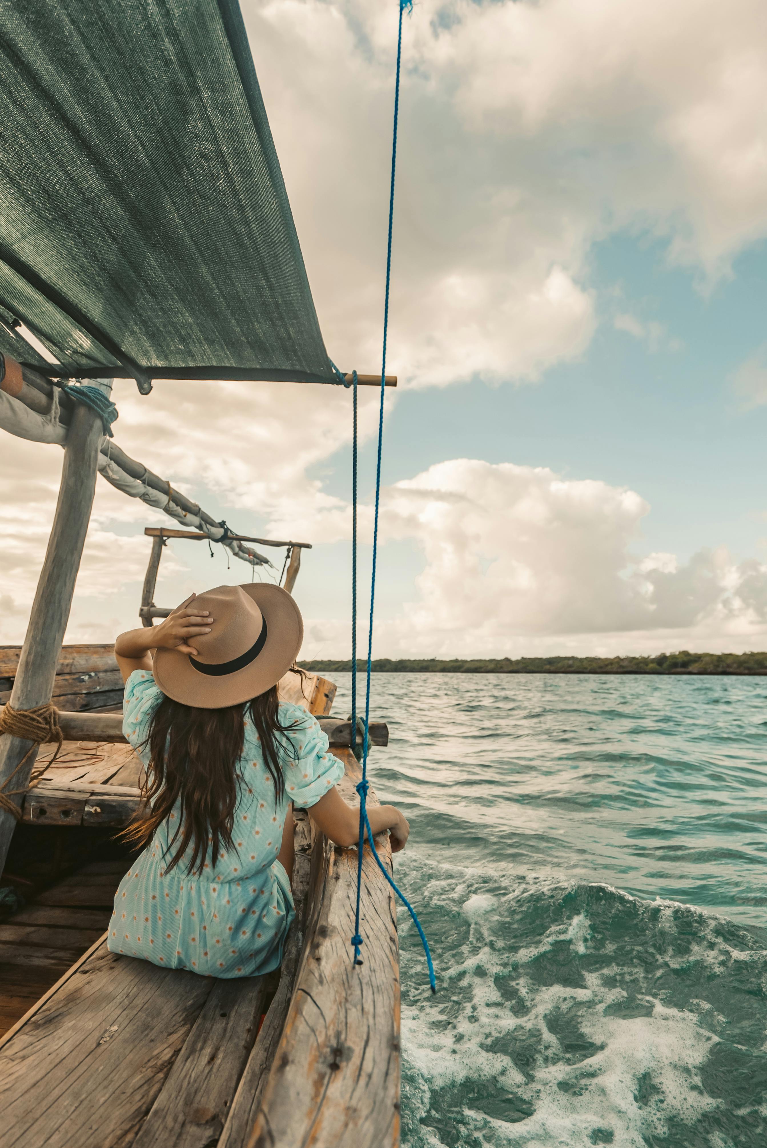 A Woman Riding a Boat · Free Stock Photo
