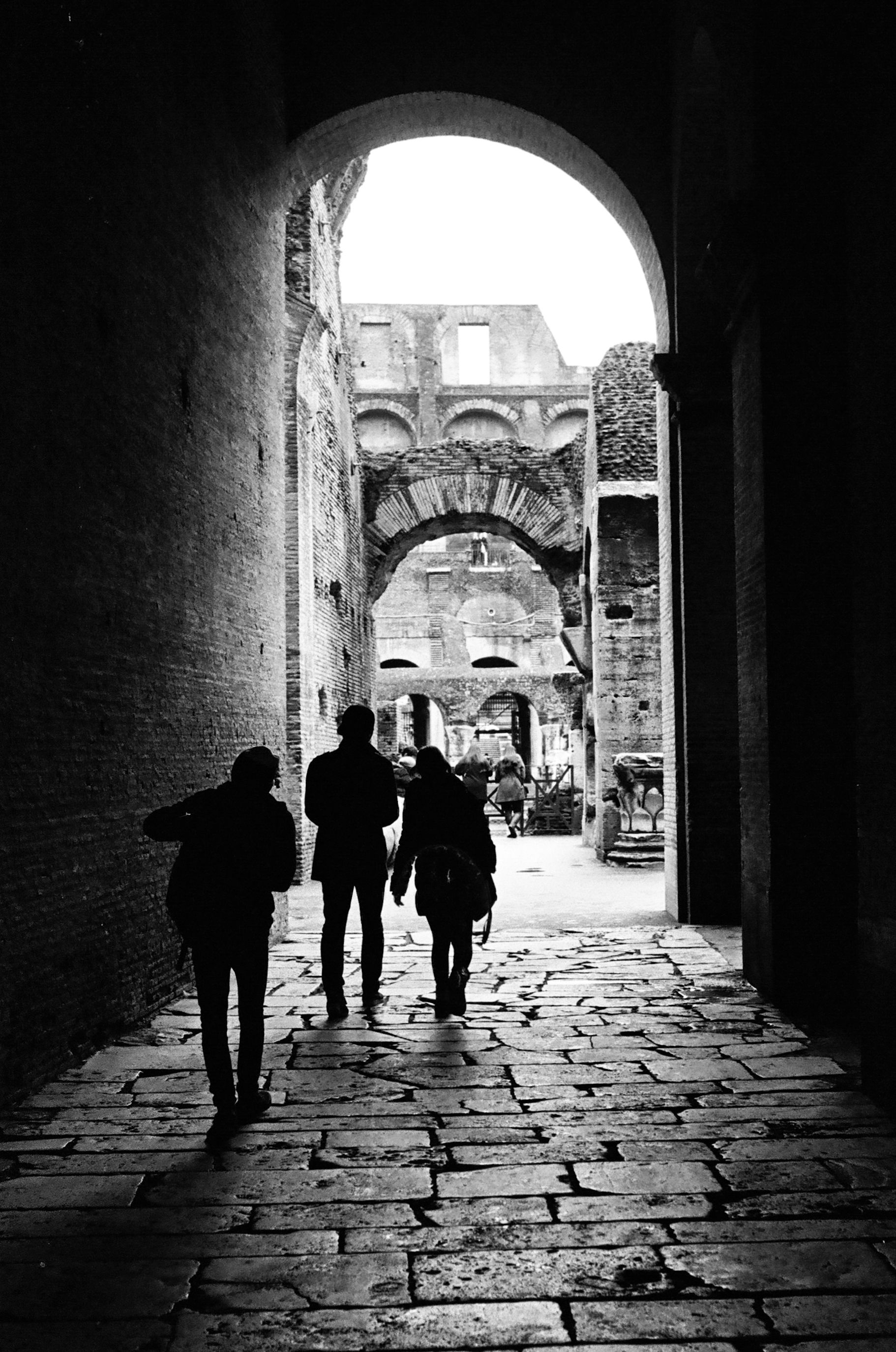 People Walking under Arch in Ancient City · Free Stock Photo