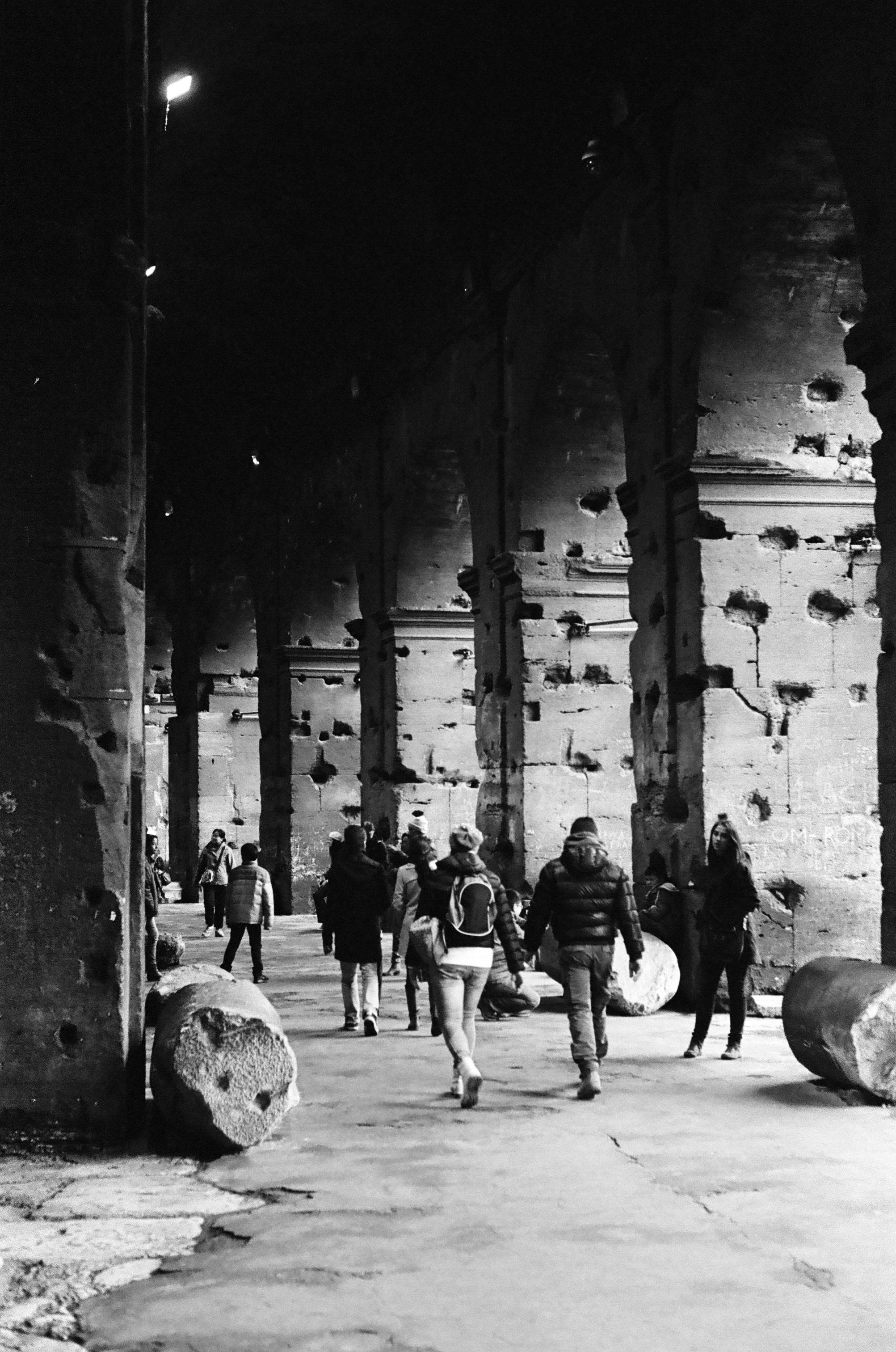 People Walking among Ruins · Free Stock Photo