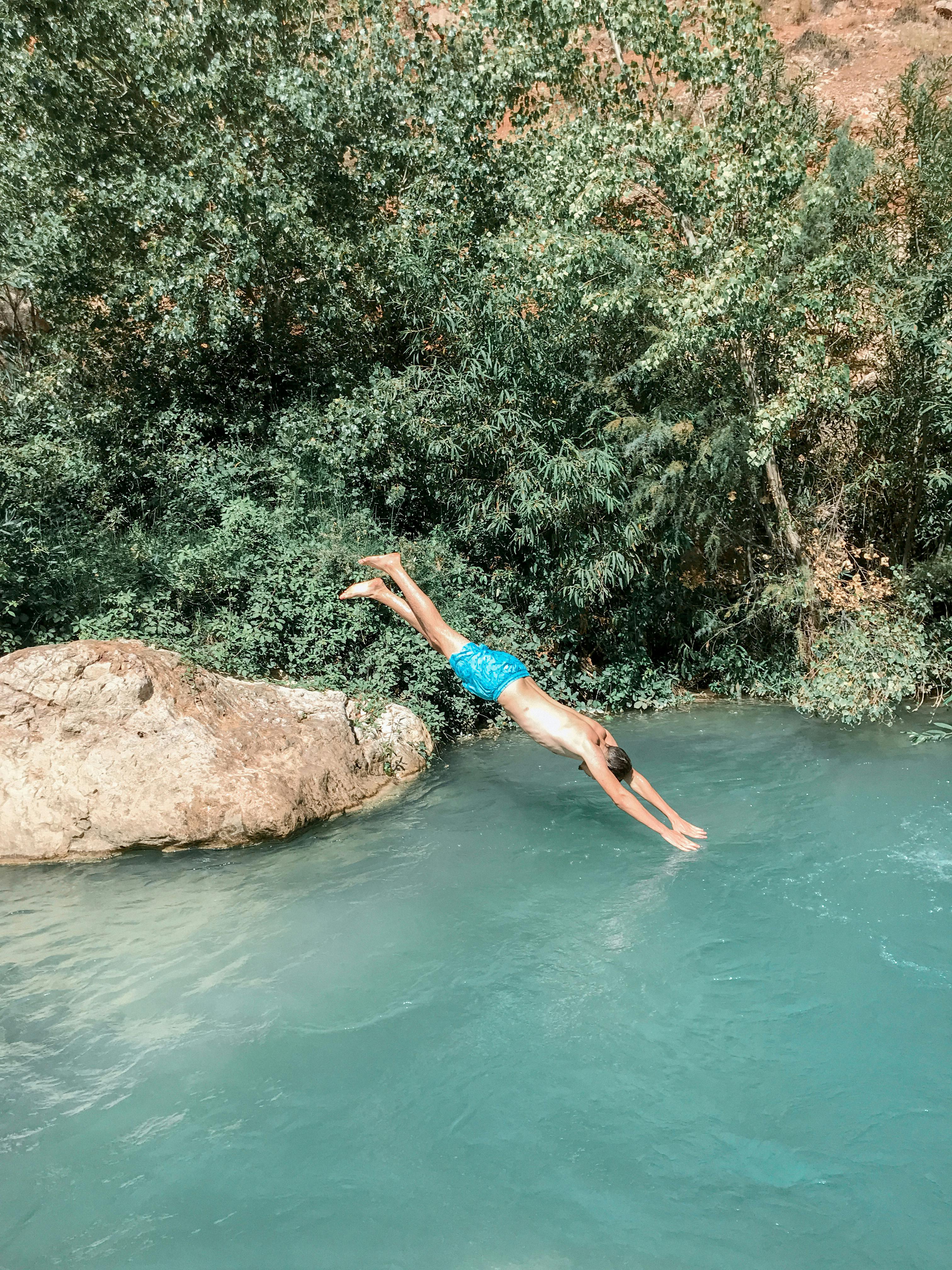 Photo of Man Diving in to Water · Free Stock Photo