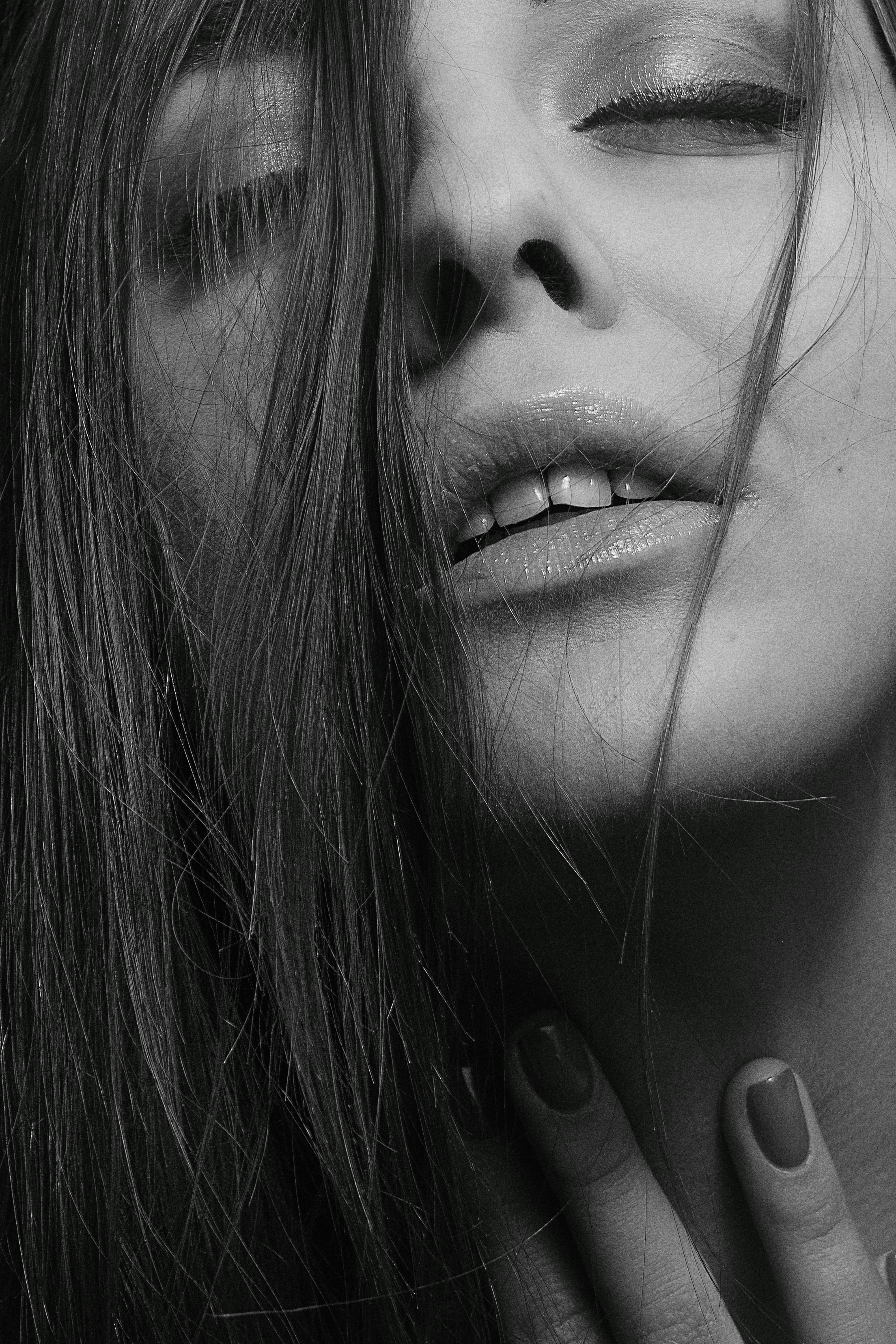 Grayscale Photography of a Woman's Face with Eyes Closed · Free Stock Photo