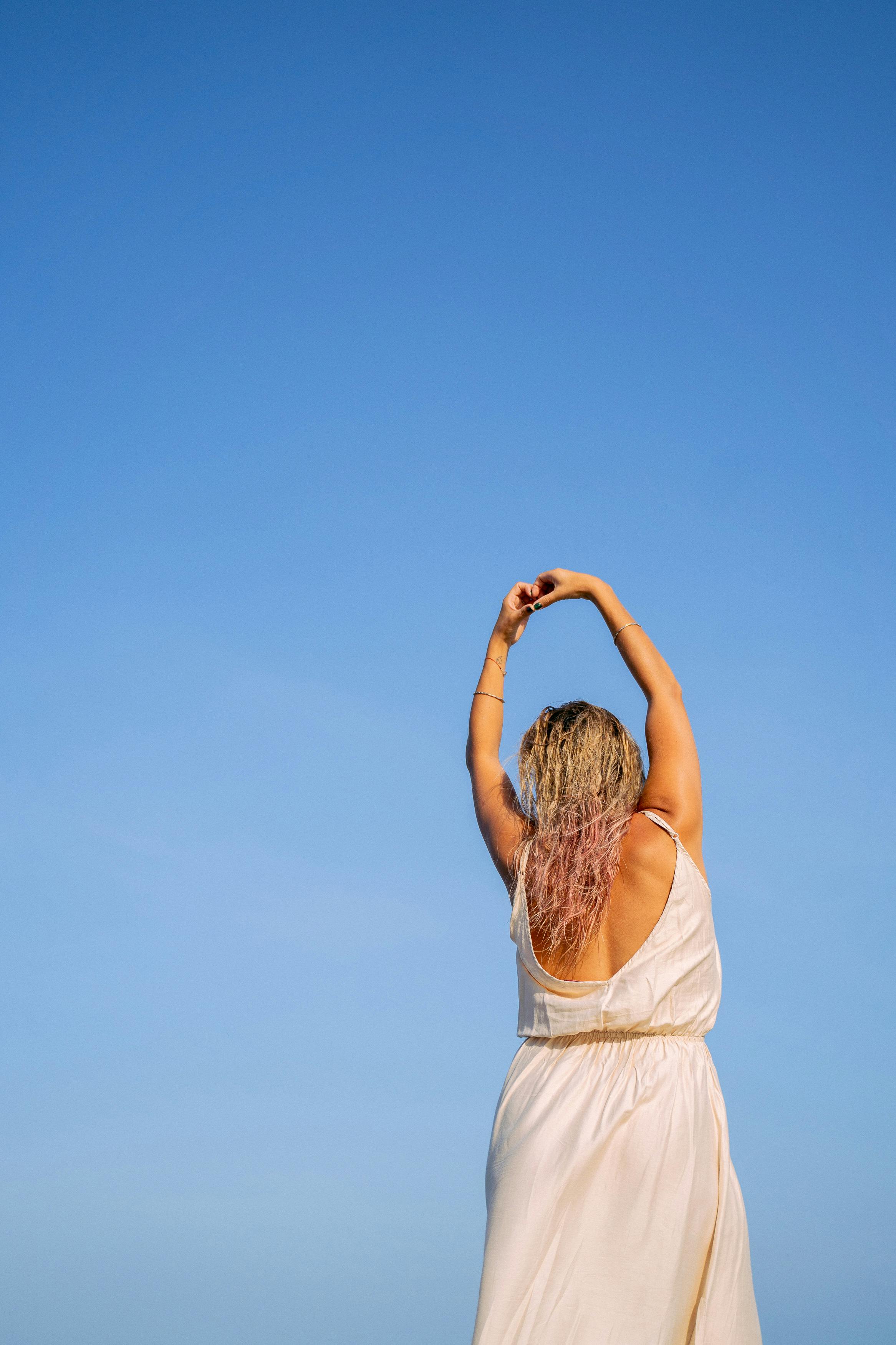 Person Raising His/Her Hands · Free Stock Photo
