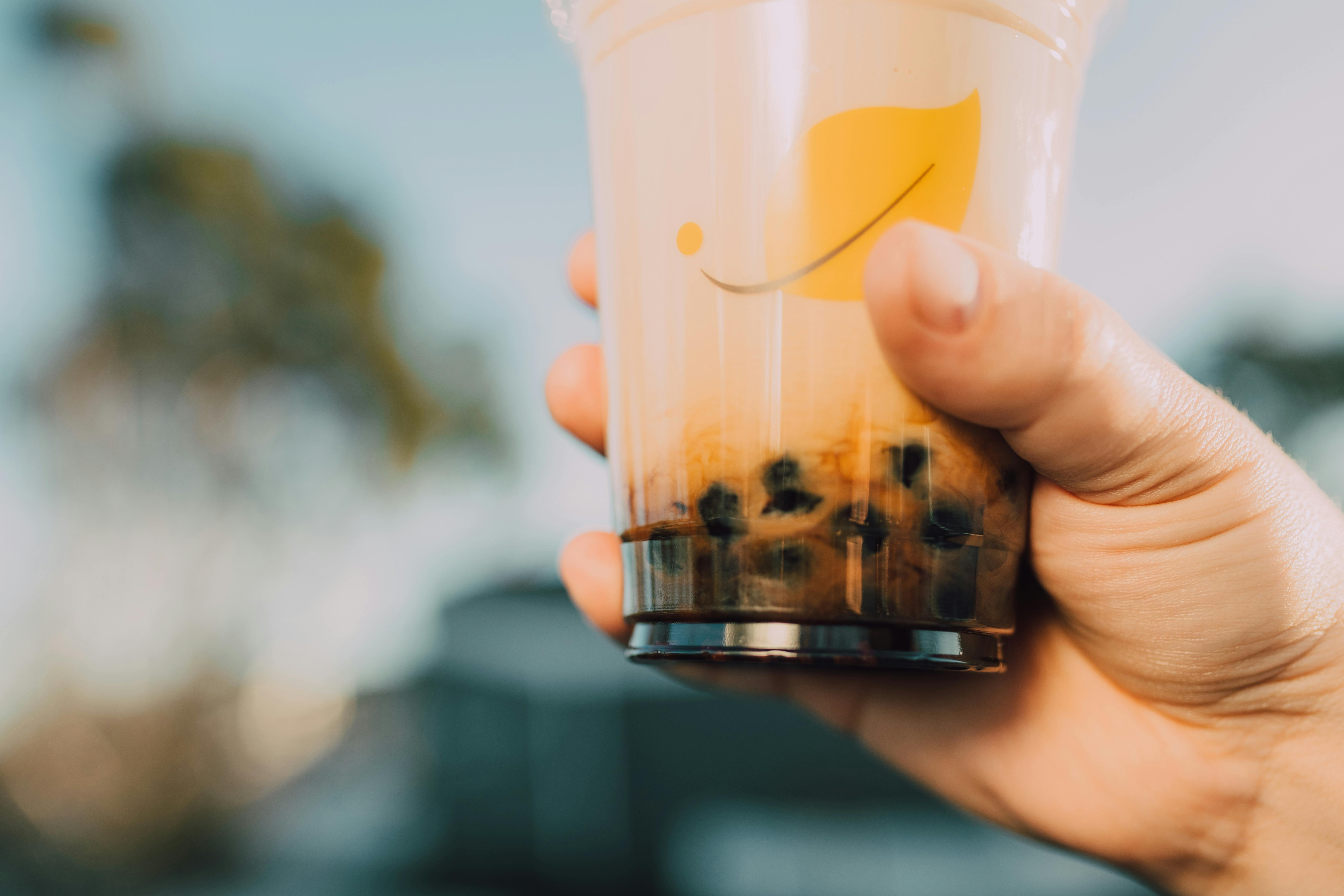 A Person Holding a Milk Tea · Free Stock Photo