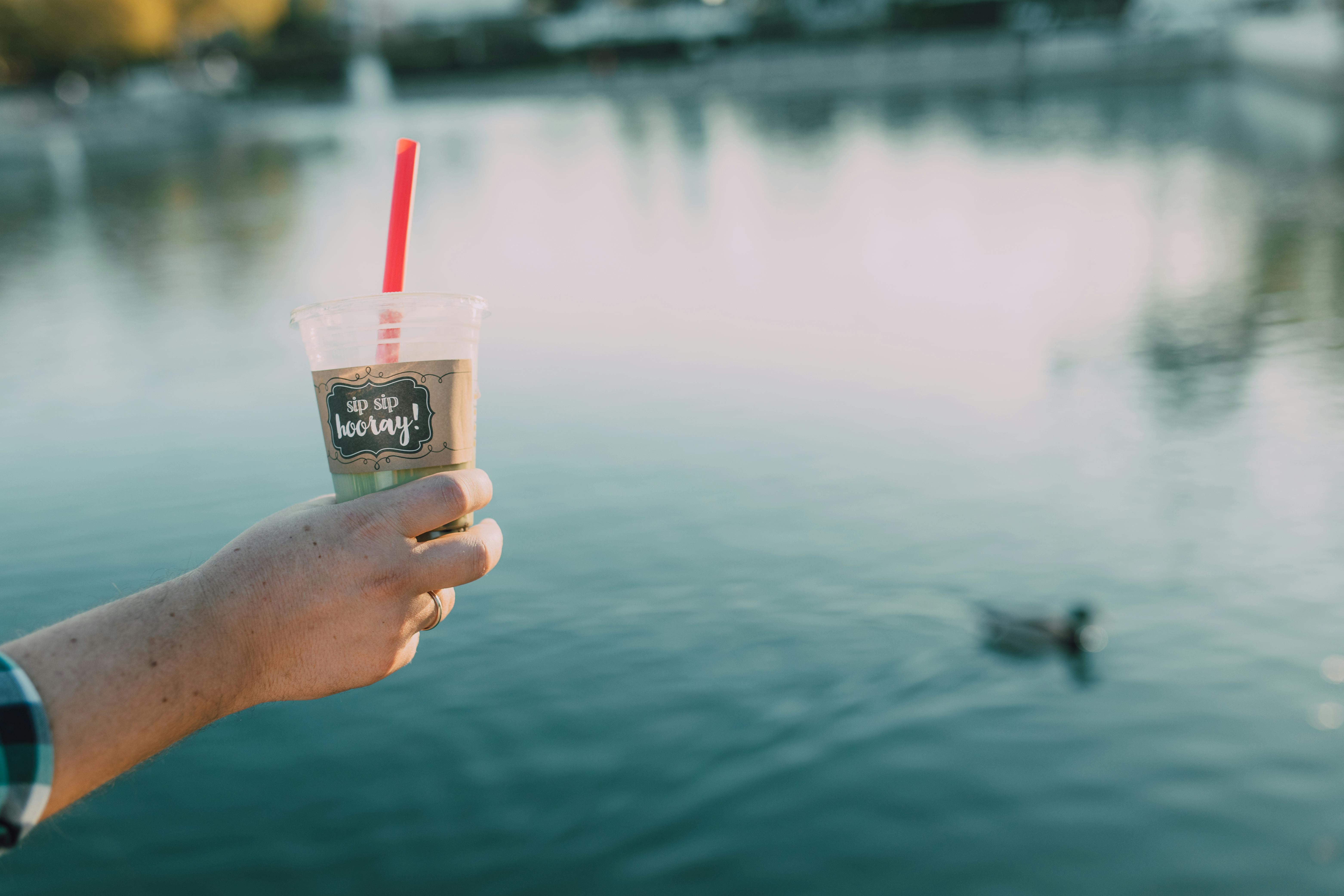 Man with Painted Nails and a Tattoo Drinking Monster Energy Drink ...