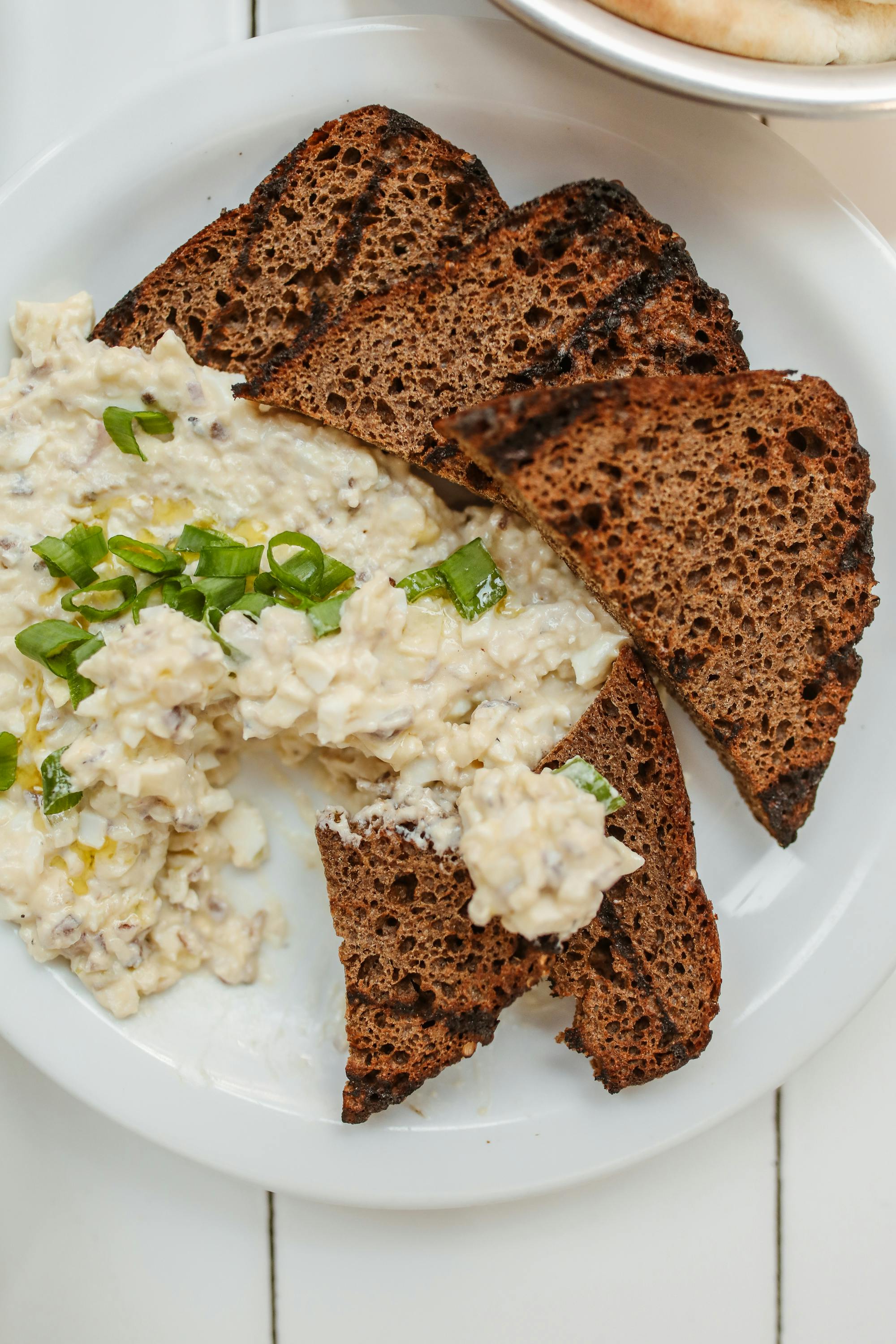 Photo of a Plate with Bread · Free Stock Photo