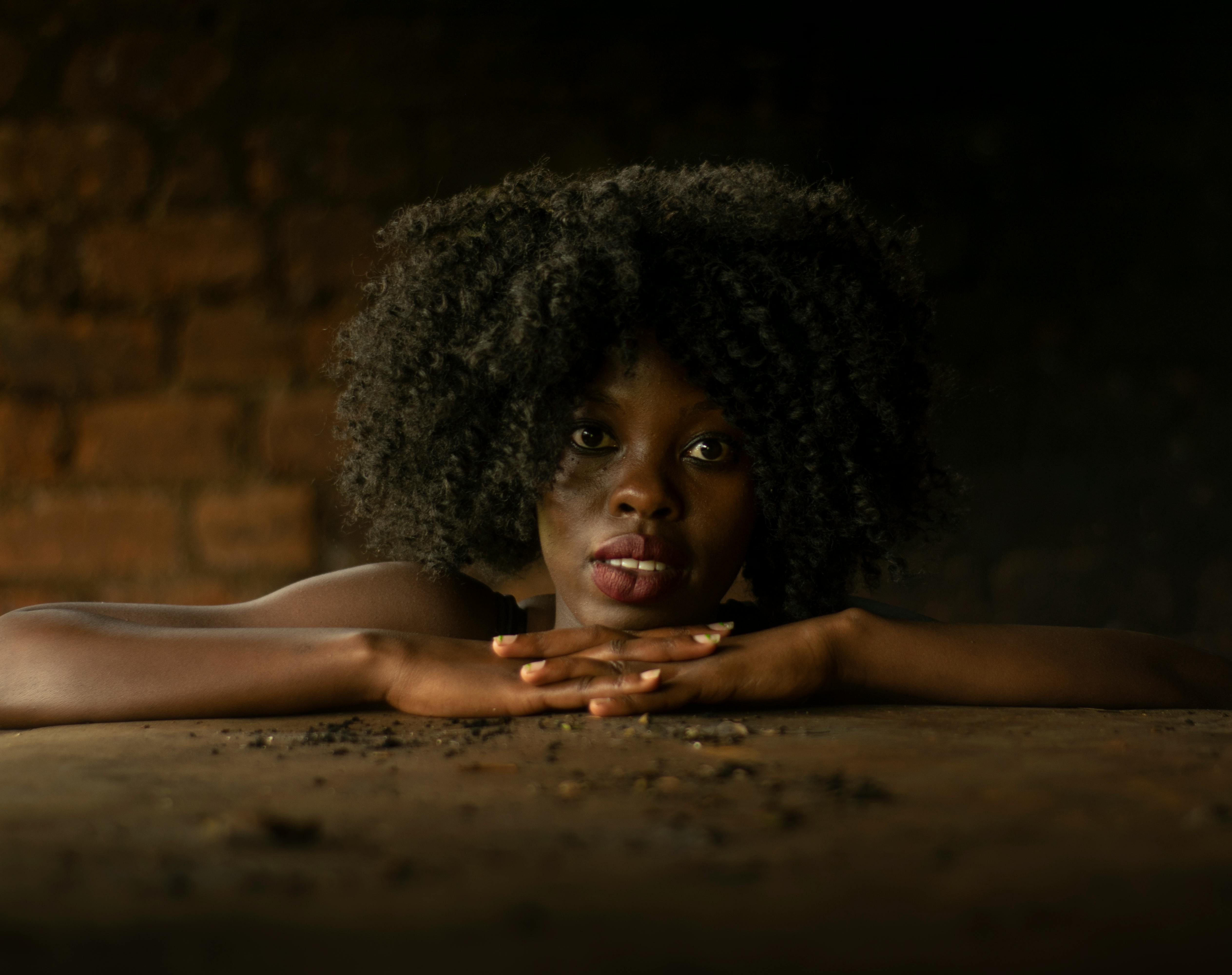 Portrait of a Woman behind Bars · Free Stock Photo