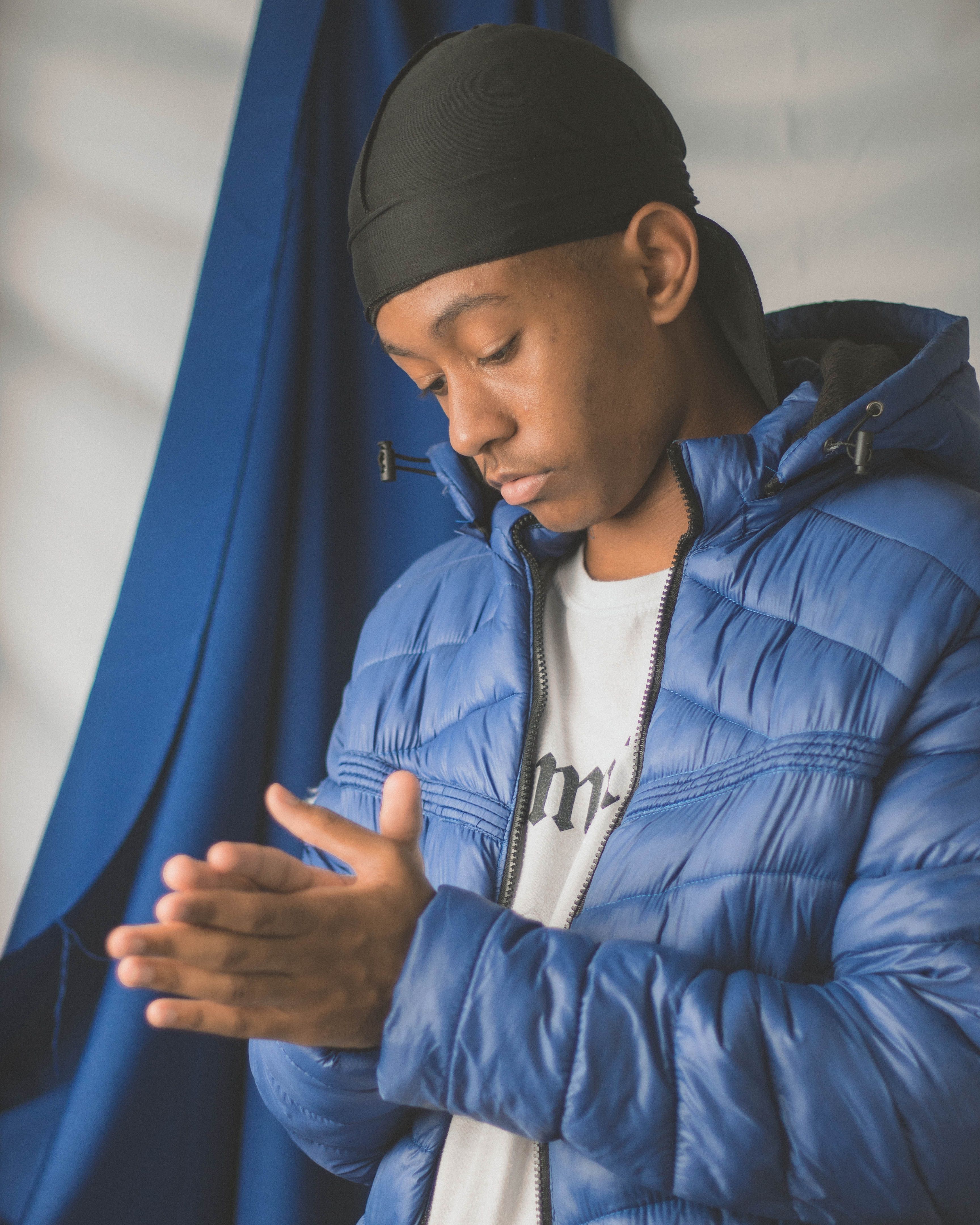 A Man Wearing Blue Durag on his Head · Free Stock Photo