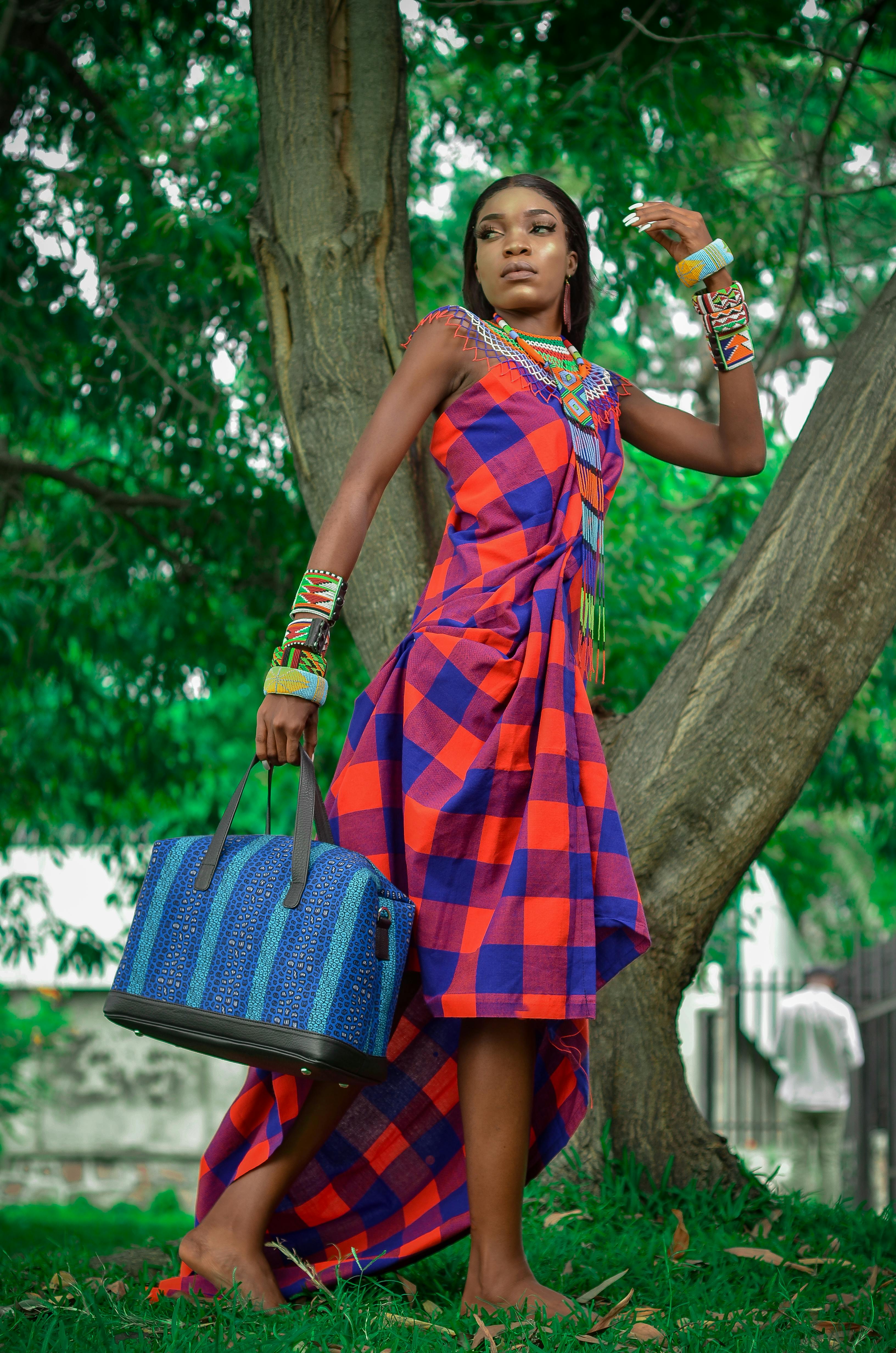 Photo of a Woman in Traditional Clothes Walking on the Grass · Free ...