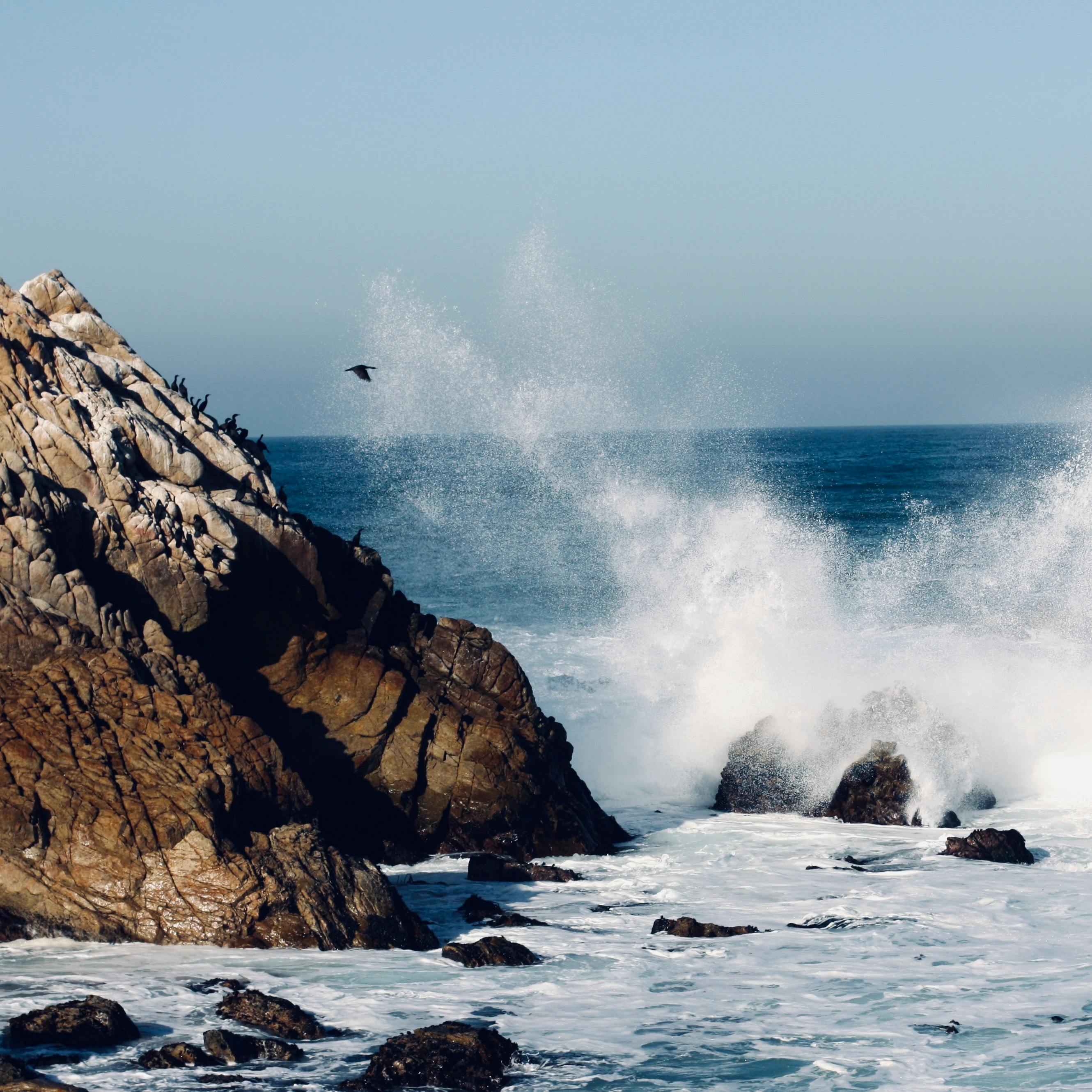 A Big White Rock Formation on Water · Free Stock Photo