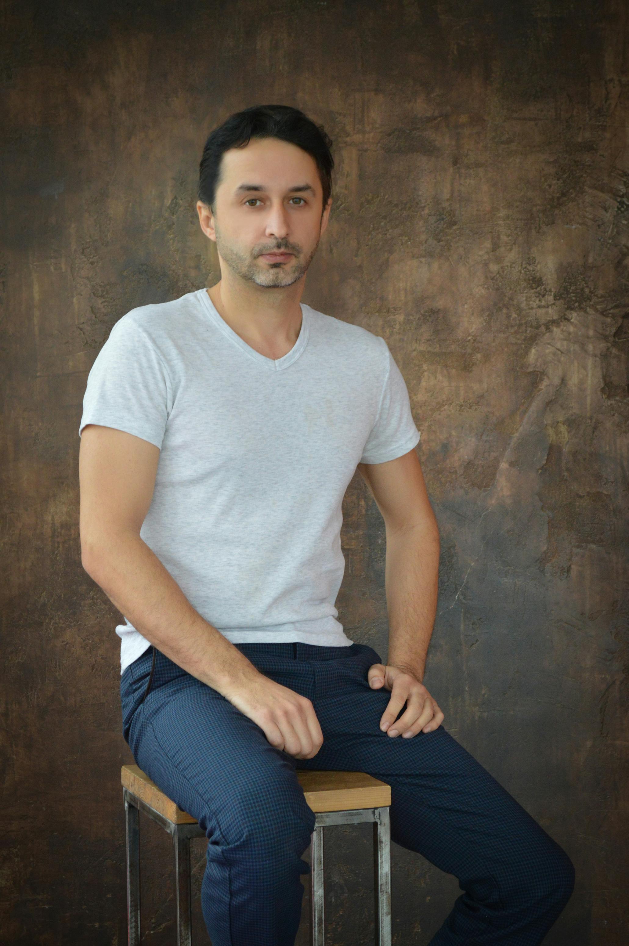 Man Sitting on Chair · Free Stock Photo