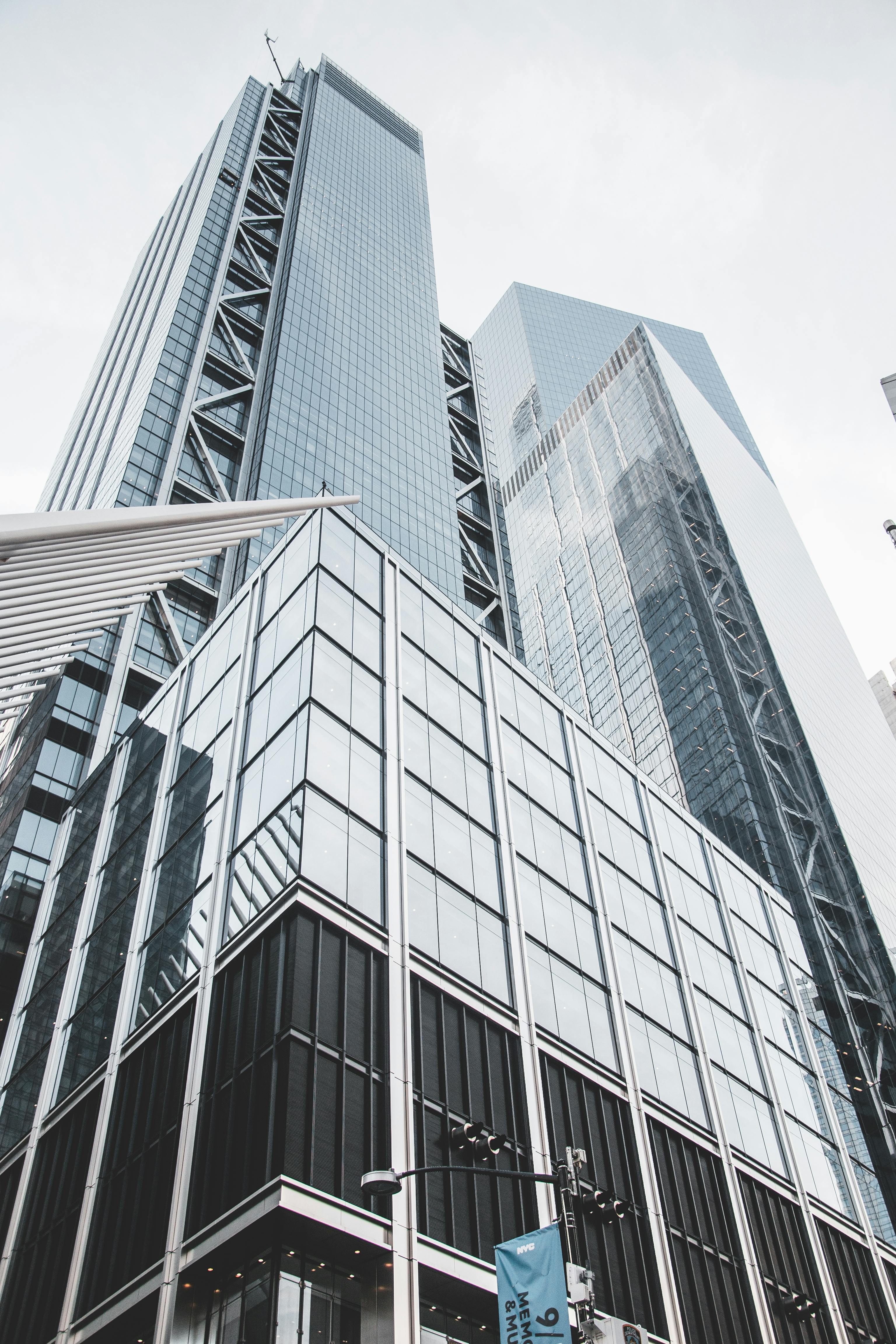 Two High-Rise Glass Buildings · Free Stock Photo