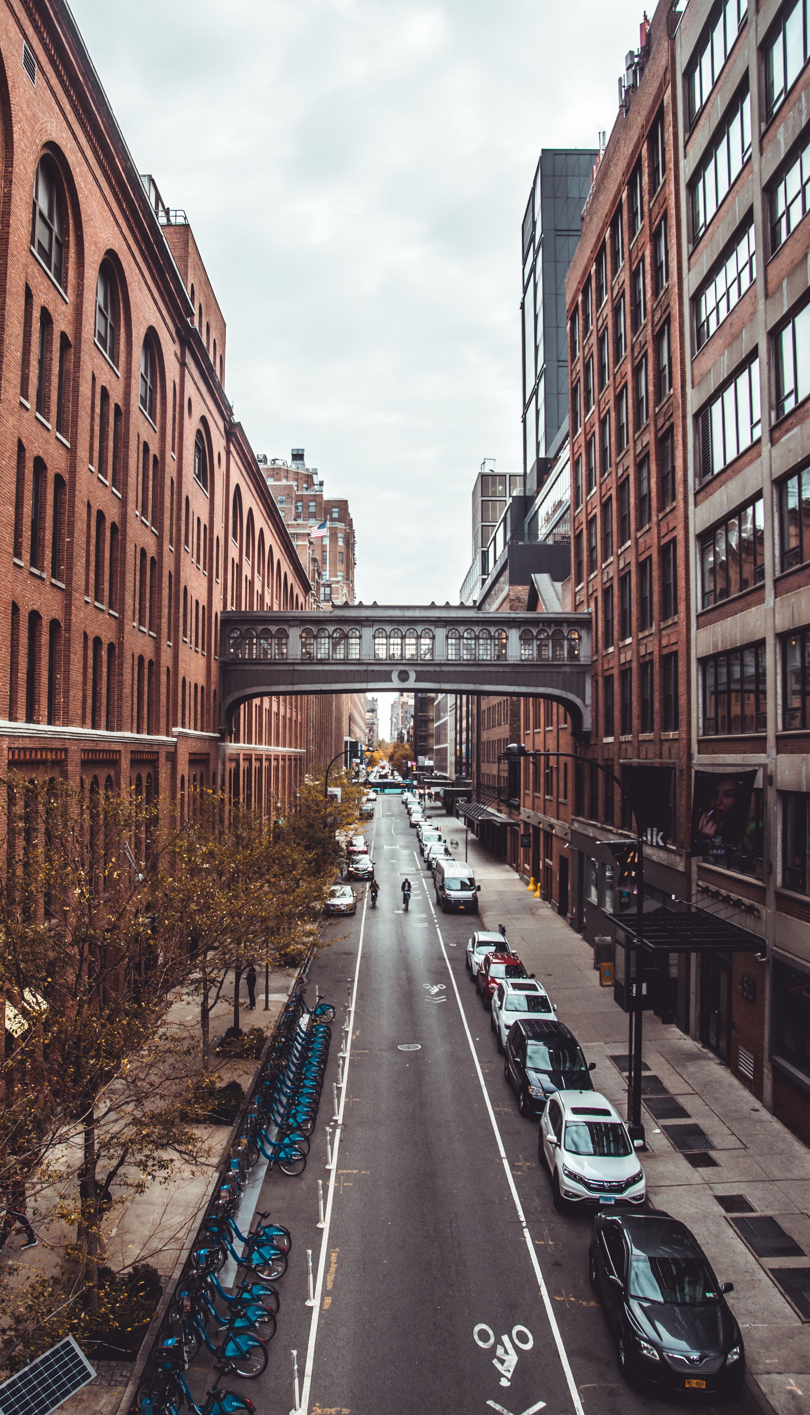 A Street Between Concrete Buildings · Free Stock Photo